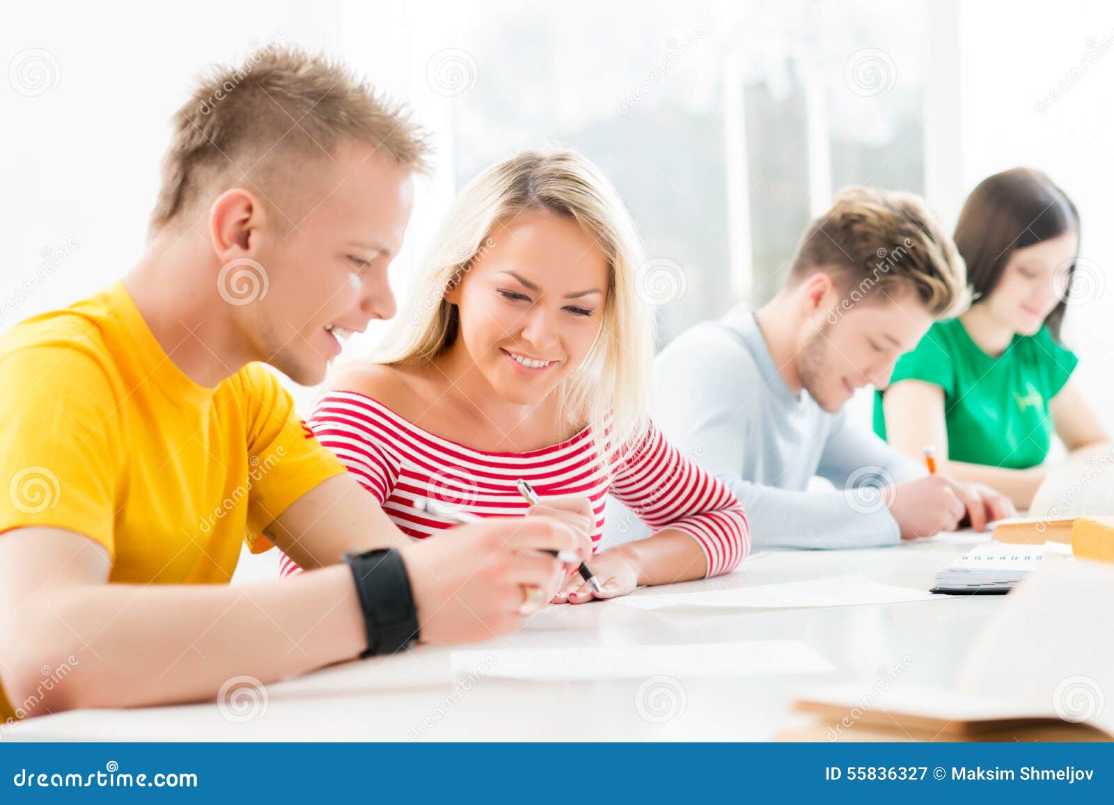 Group of Teenage Students in a Classroom Stock Image - Image of raise ...