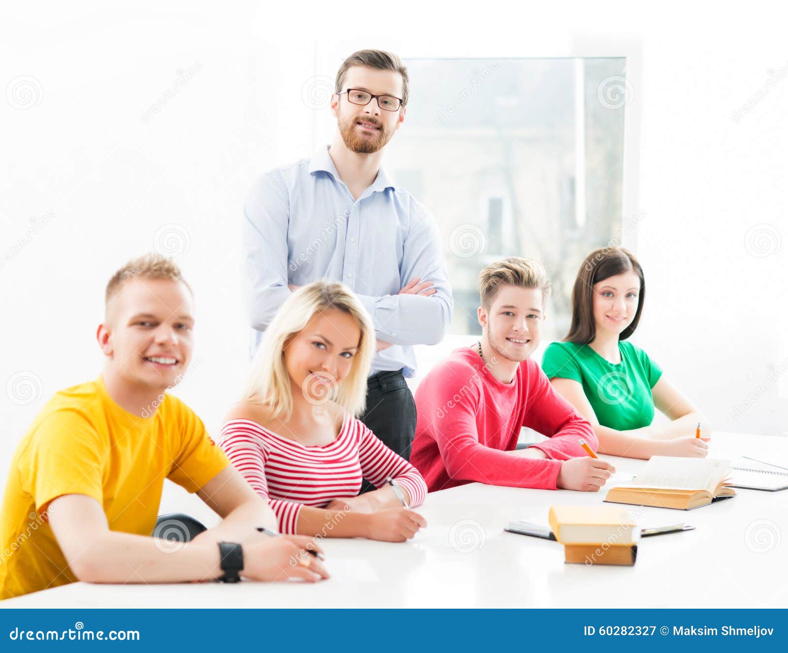 Group of Teenage Students Studying at the Lesson in the Classroom Stock ...