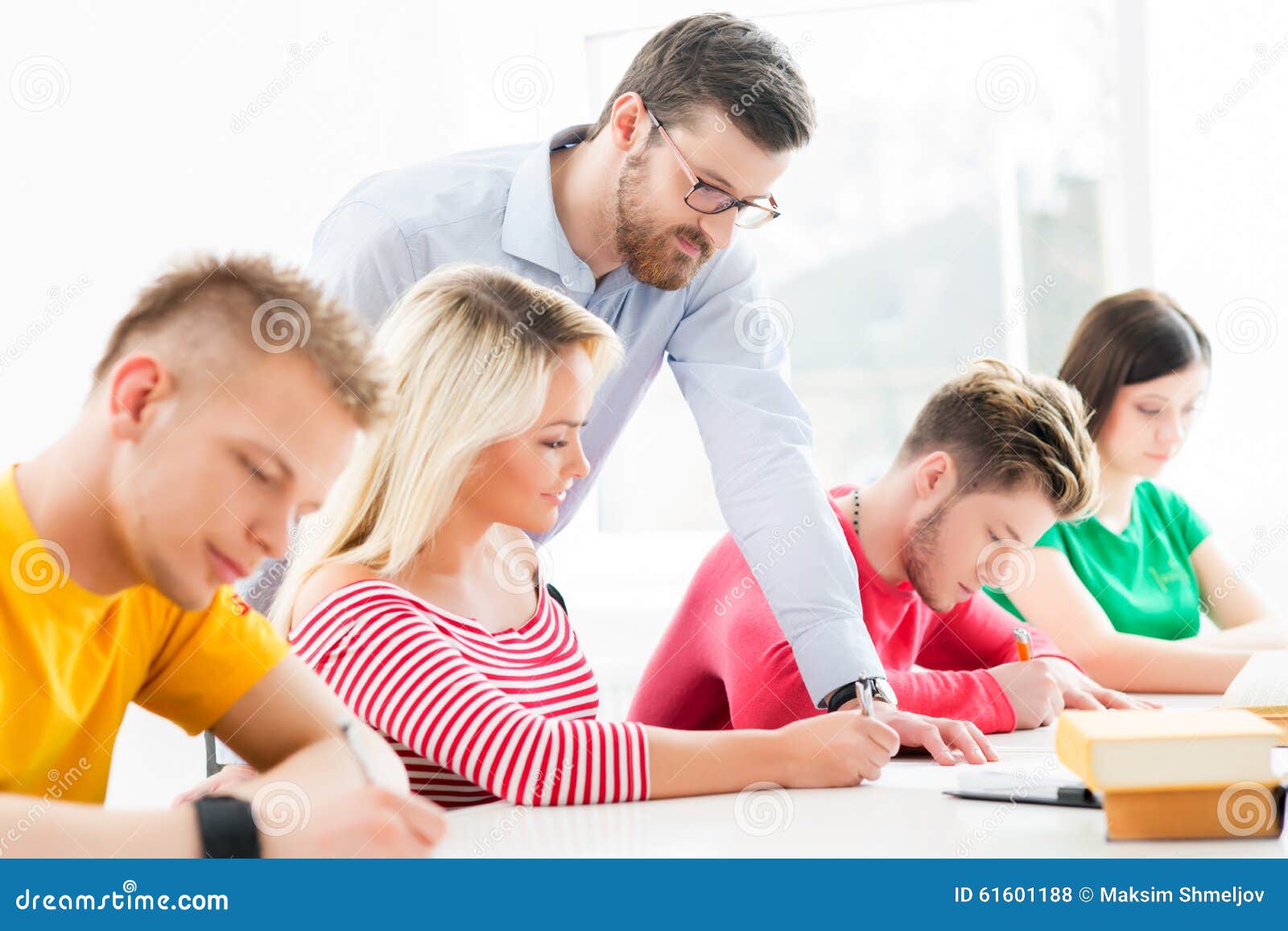 Group of Teenage Students Studying at the Lesson in the Classroom Stock ...