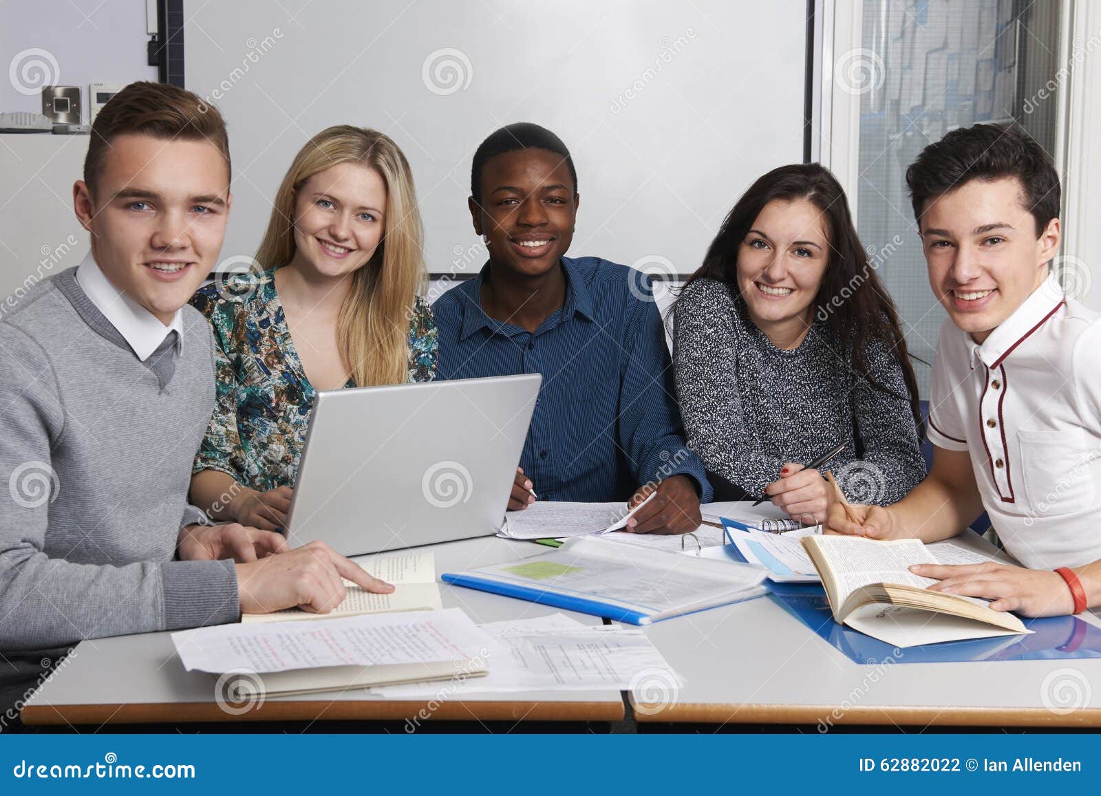 Group of Teenage Students Working in Classroom Stock Photo - Image of ...