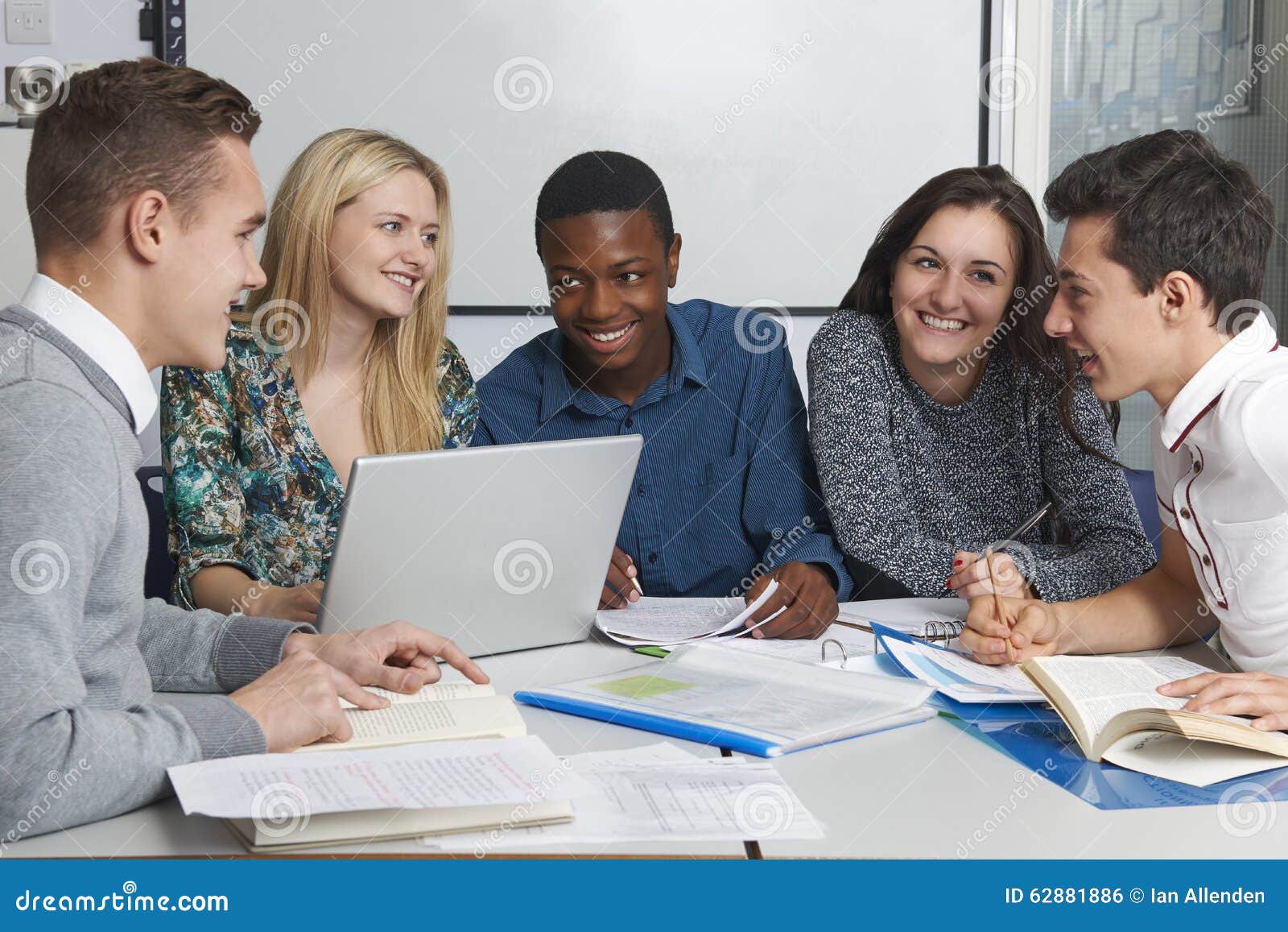 Group of Teenage Students Working in Classroom Stock Photo - Image of ...