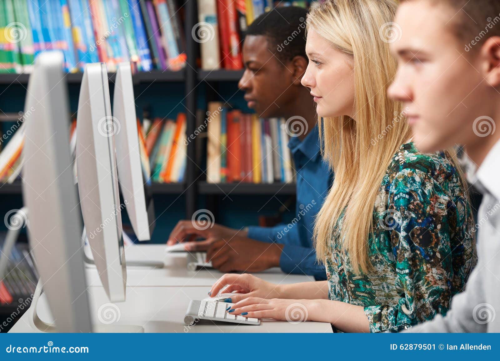 Group of Teenage Students Working at Computers in Classroom Stock Image ...