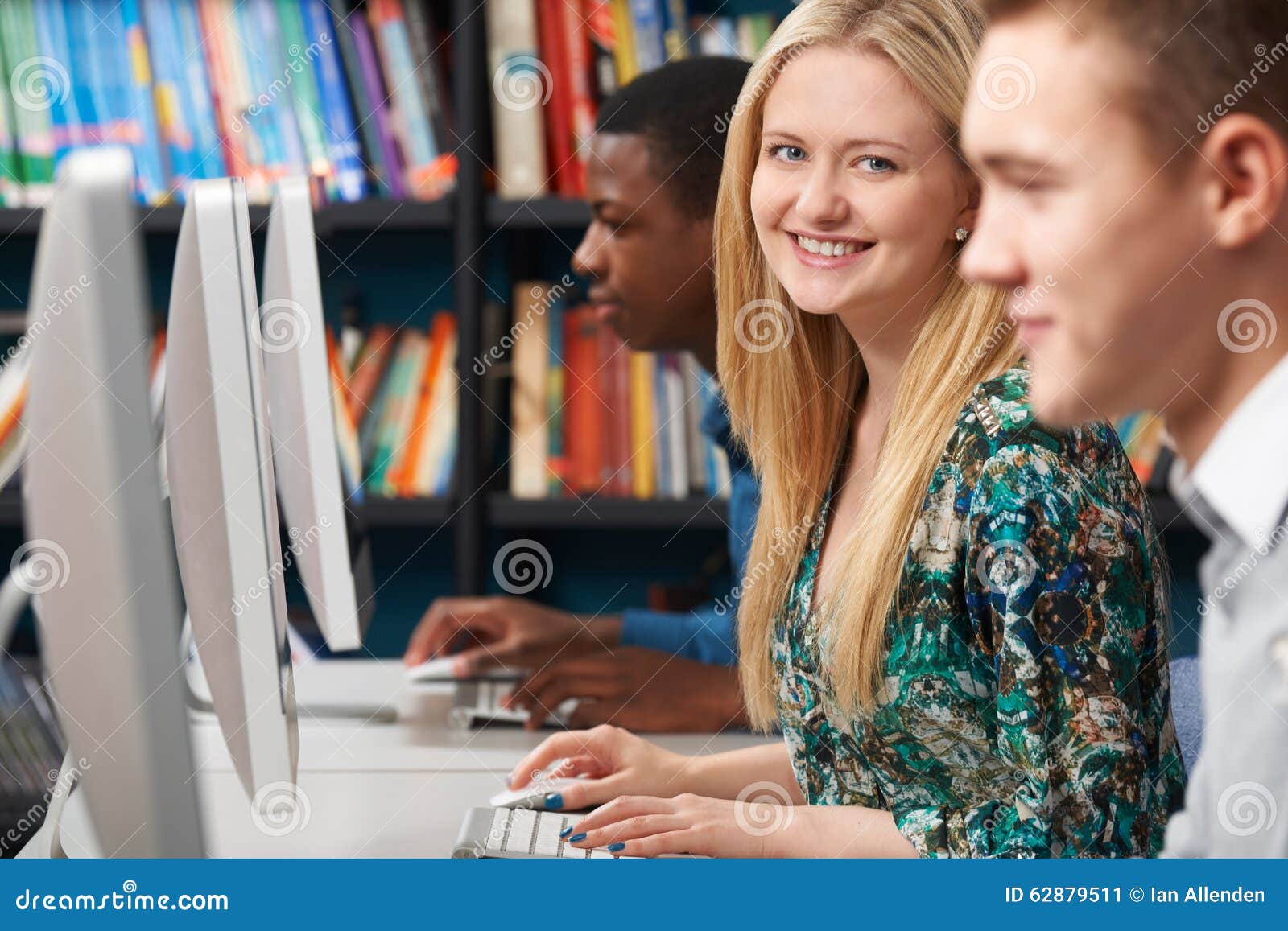 Group of Teenage Students Working at Computers in Classroom Stock Image ...