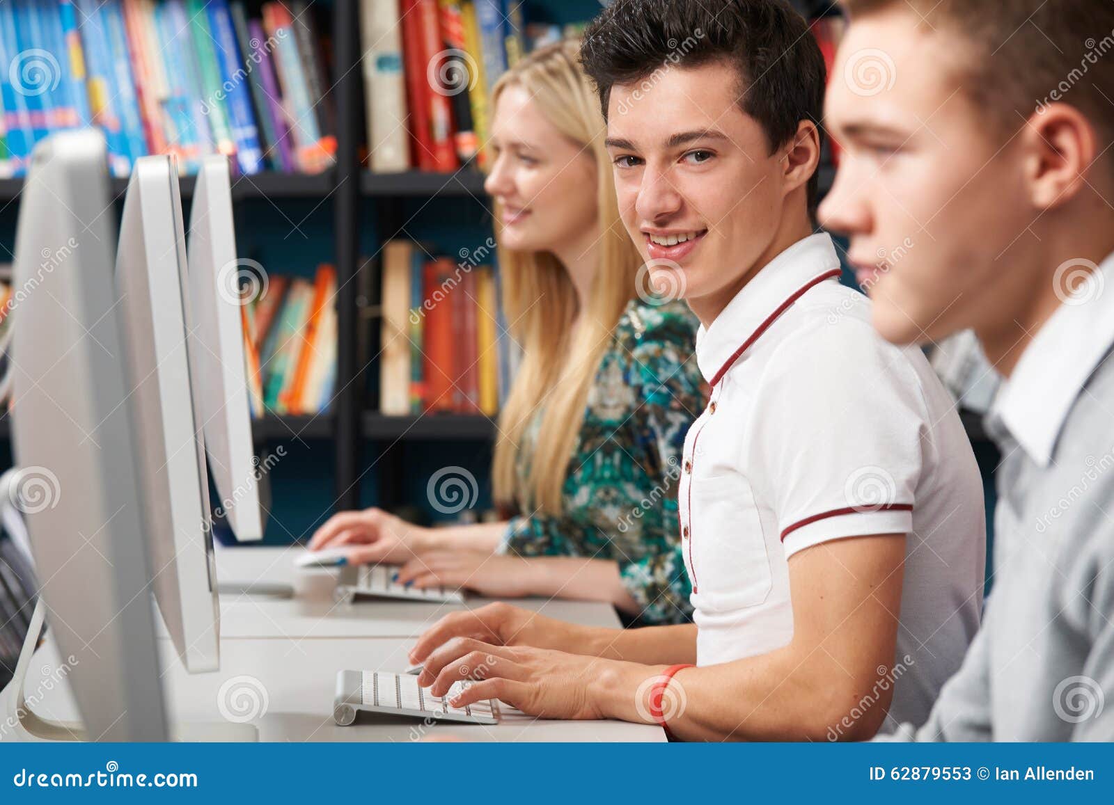 Group of Teenage Students Working at Computers in Classroom Stock Image ...