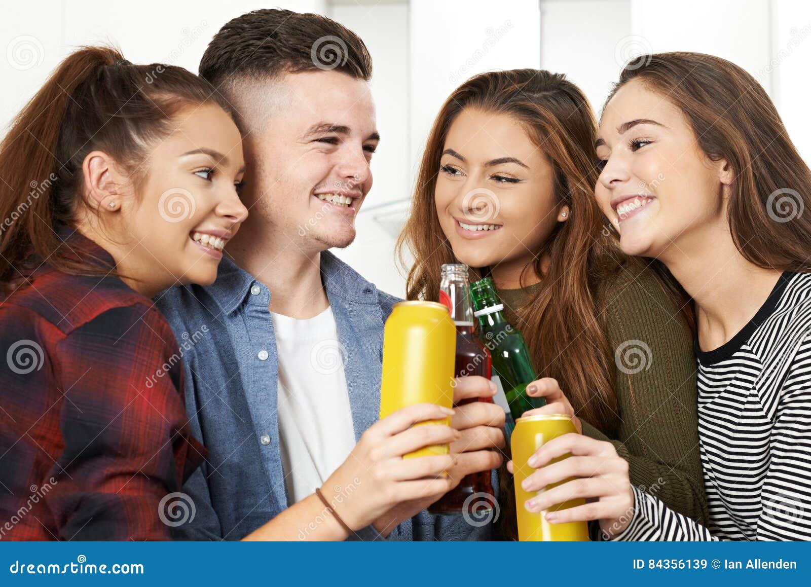 Group of Teenagers Drinking Alcohol at Party Stock Image - Image of ...