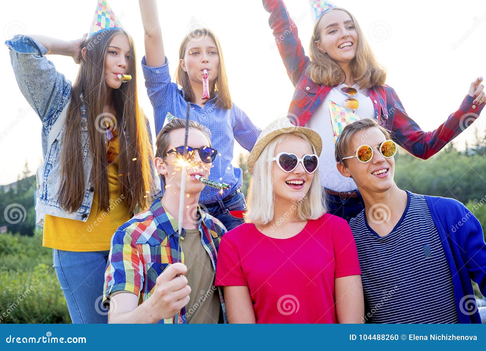 Teens having a party stock photo. Image of holiday, confetti - 104488260