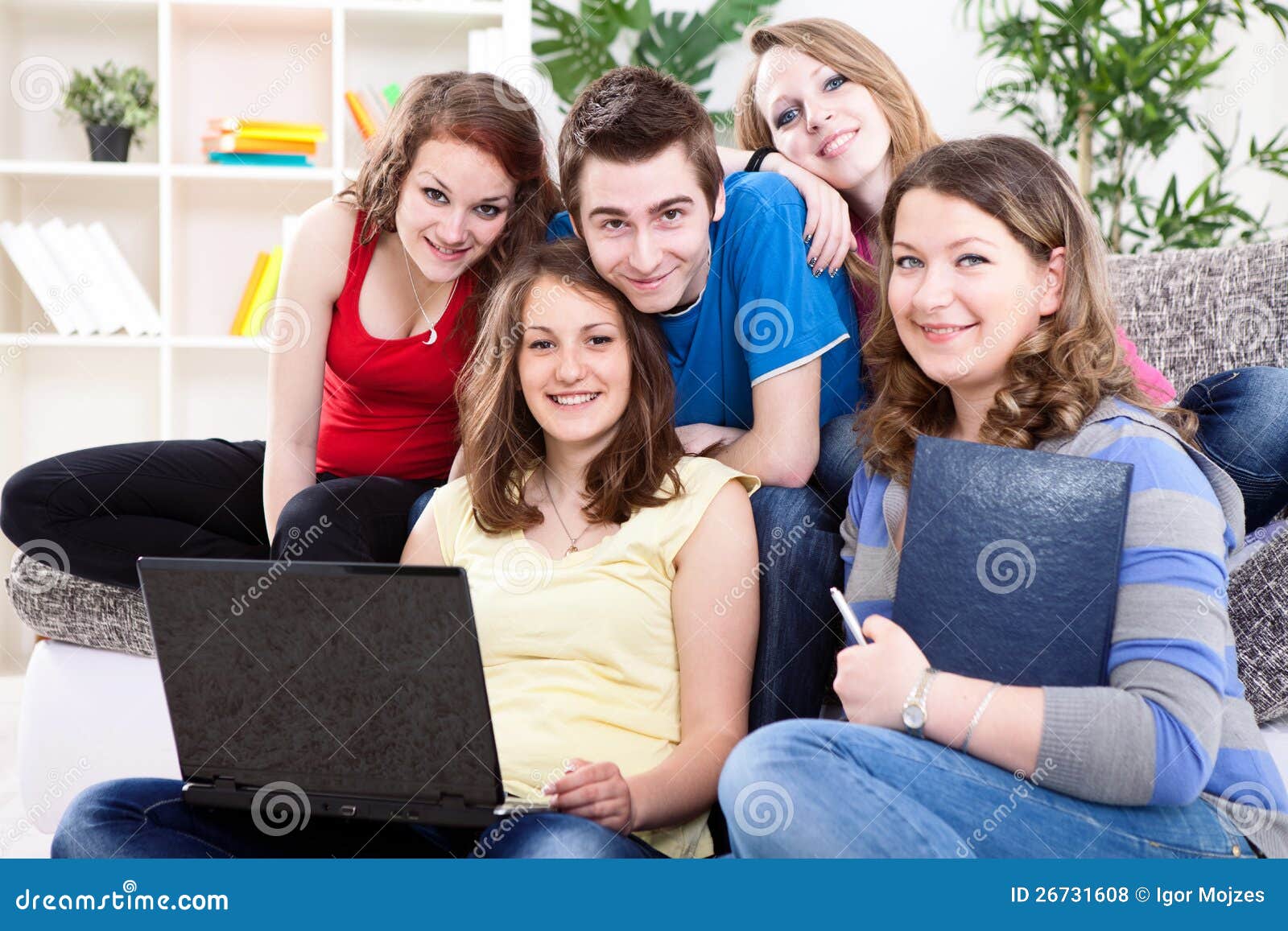 Group of teens with laptop stock photo. Image of people - 26731608