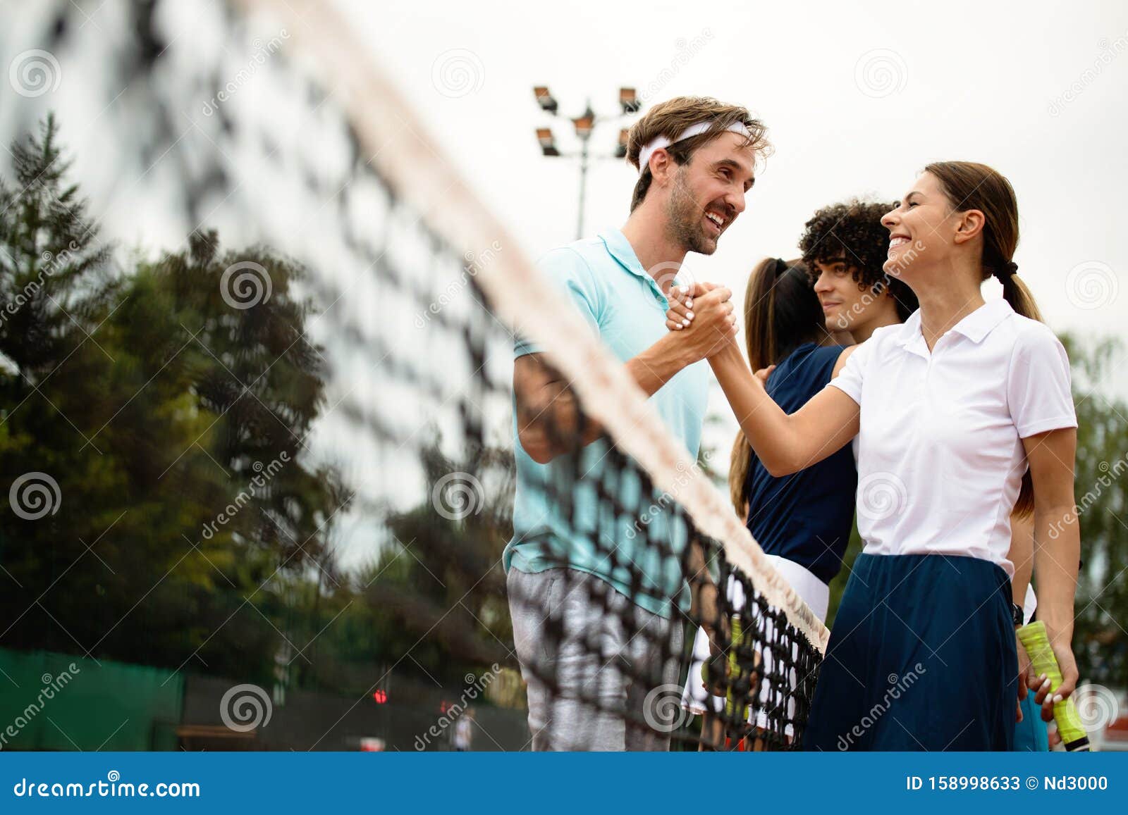 Group of Tennis People Players Giving a Handshake after a Match Stock ...