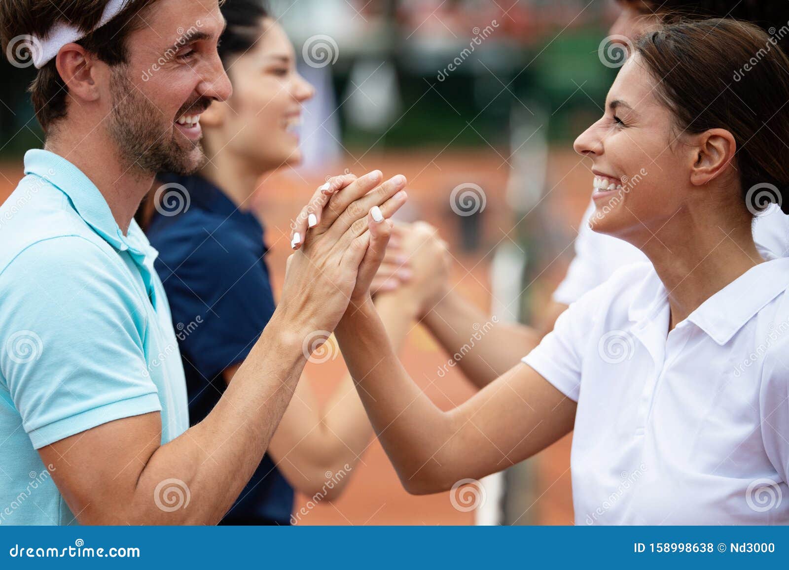 Group of Tennis People Players Giving a Handshake after a Match Stock ...