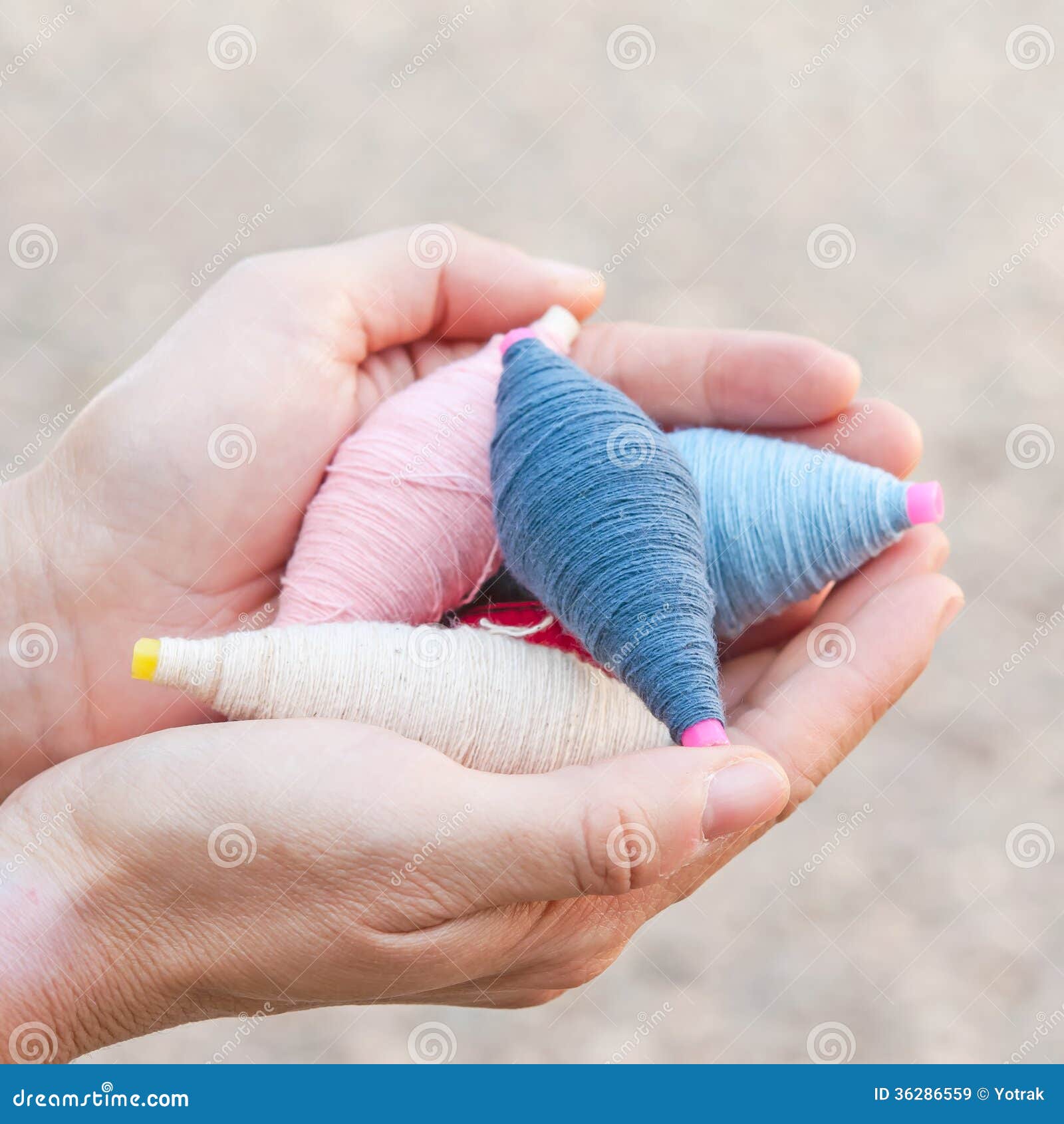 Group of thread on hand stock image. Image of textile - 36286559