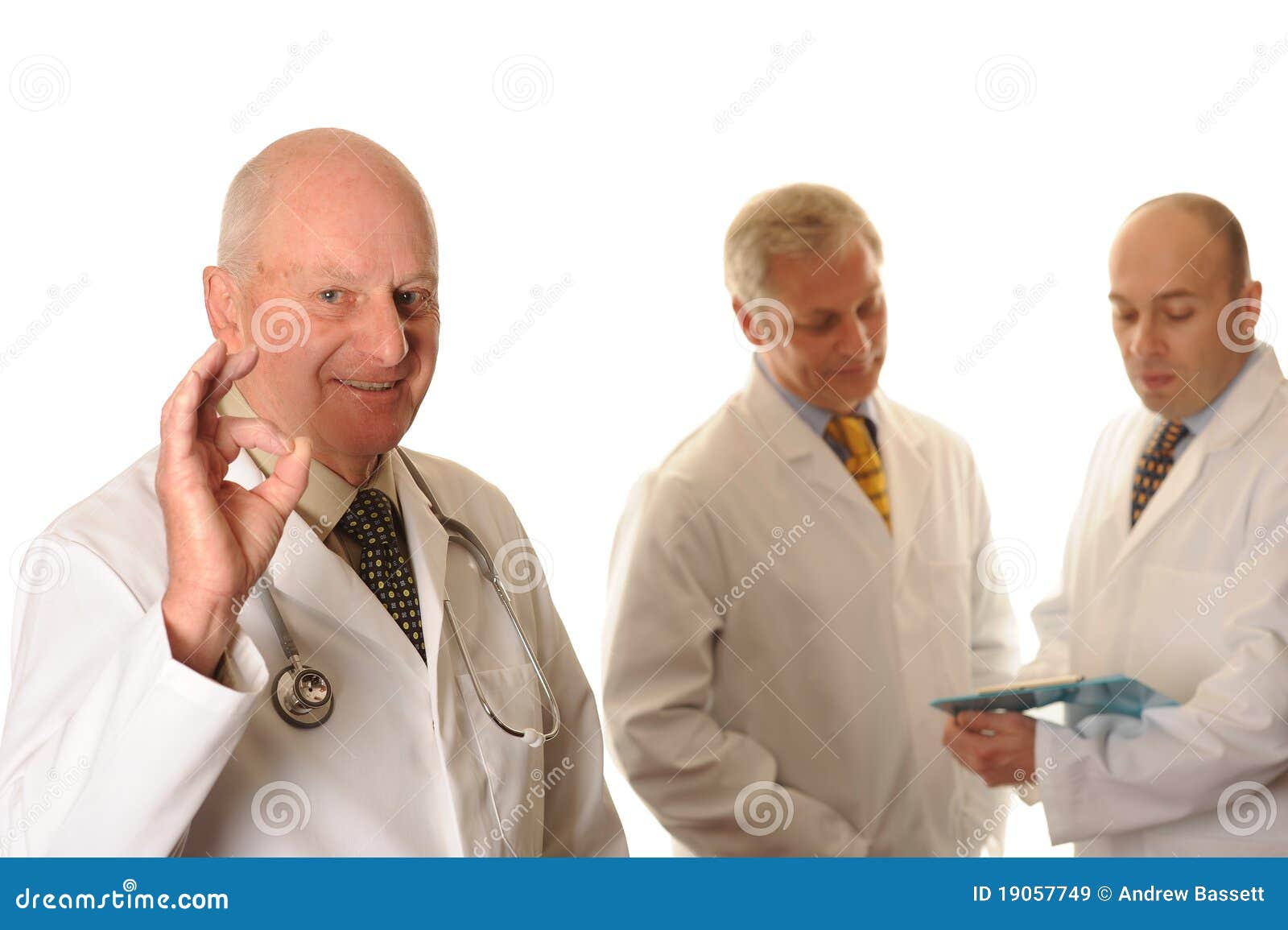 A group of three Doctors stock image. Image of professional - 19057749