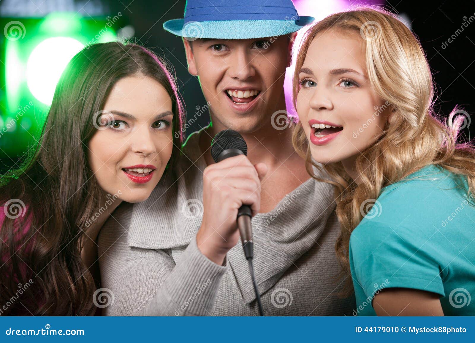 Group of Three Friends Singing with Microphone. Stock Photo - Image of ...