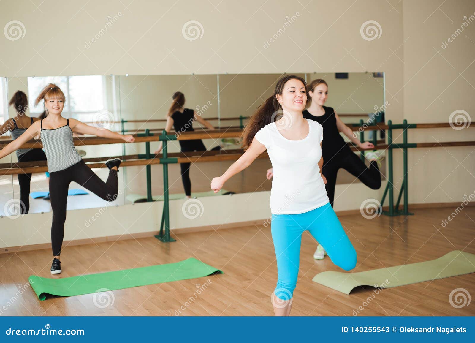 Group of Three Girls Doing Exercises in the Gym Stock Image - Image of ...