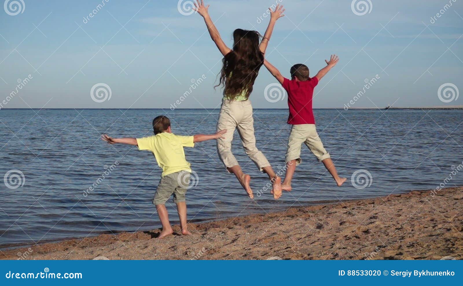 Group of Three Kids Jumping at the Beach in Egypt Resort, Slow M Stock ...