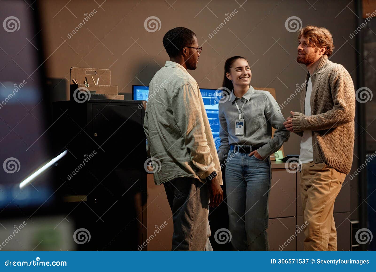 Group of Three People Standing in Office and Talking Stock Image ...