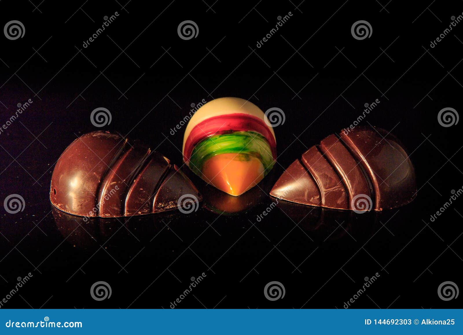 Group of Three Shell-shaped Black and White Chocolate Candies Stock ...