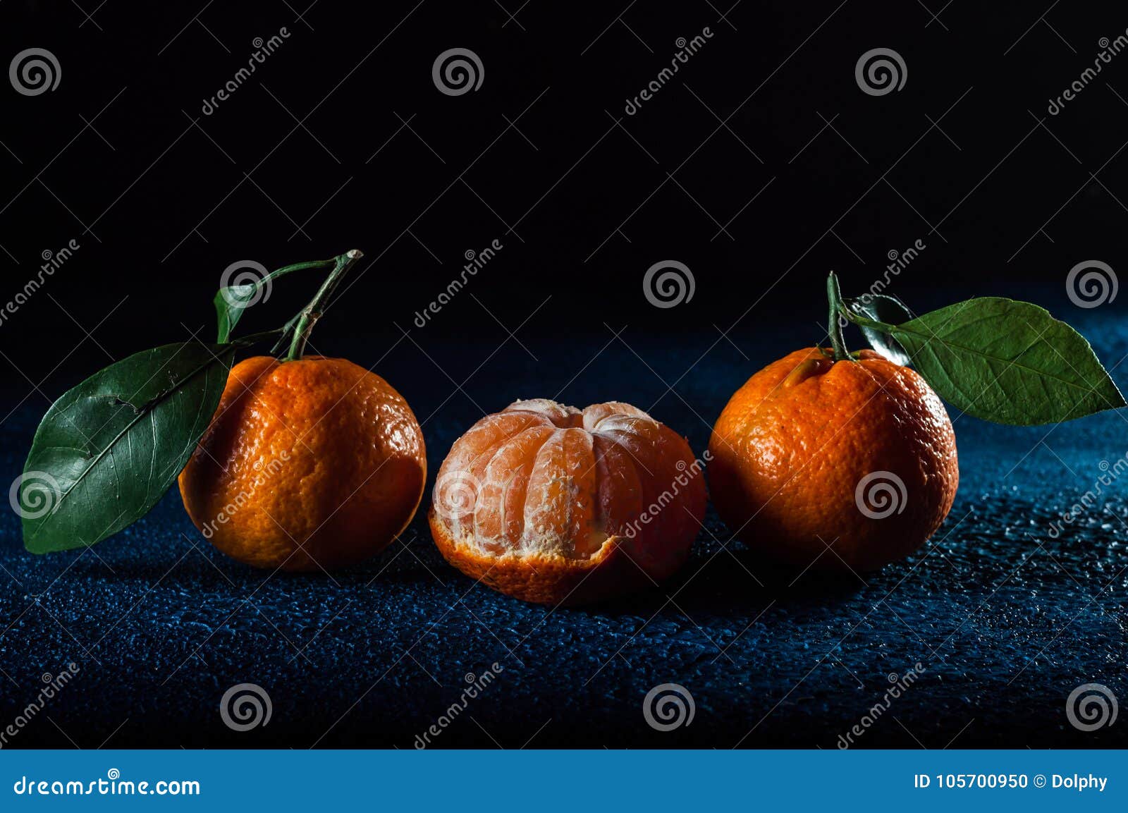 A Group of Three Tangerines Stock Photo - Image of ripe, black: 105700950