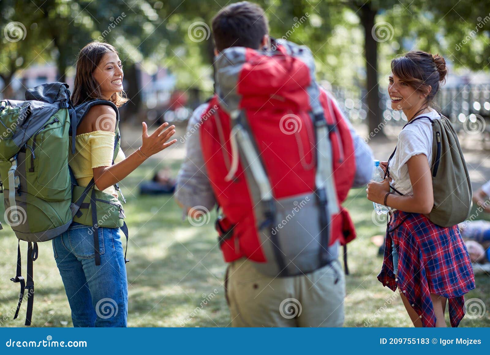 Group of Three Travellers Sightseeing Stock Image - Image of outdoor ...