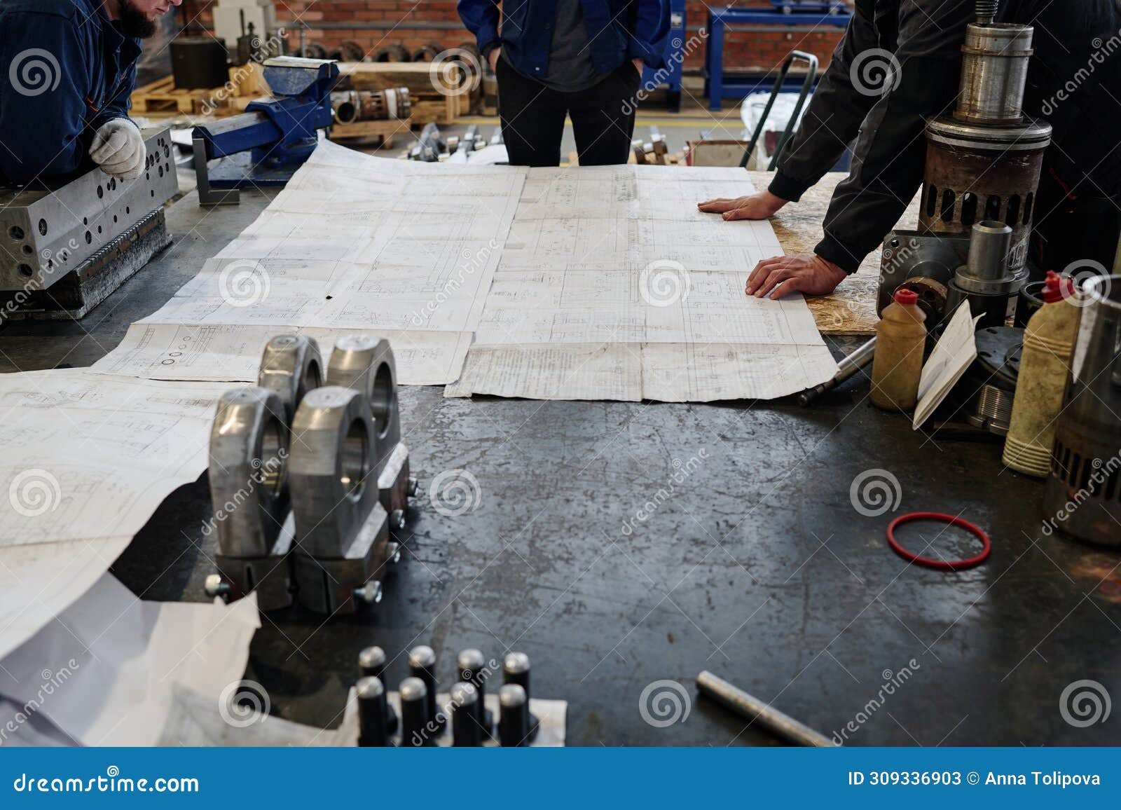 Unrecognizable Workers Using Technical Drawings Stock Image - Image of ...