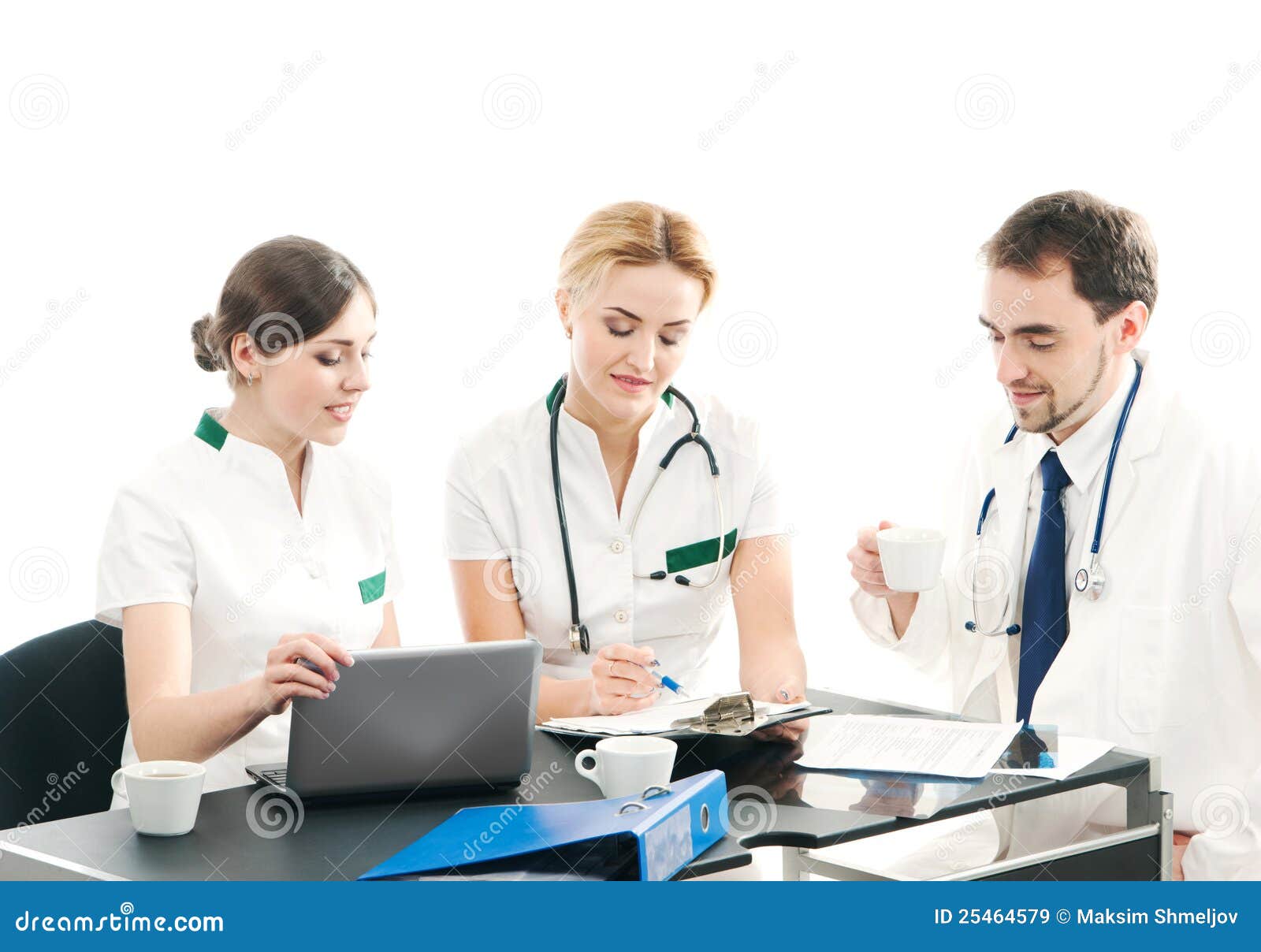 A Group of Three Young Doctors Working Together Stock Image - Image of ...