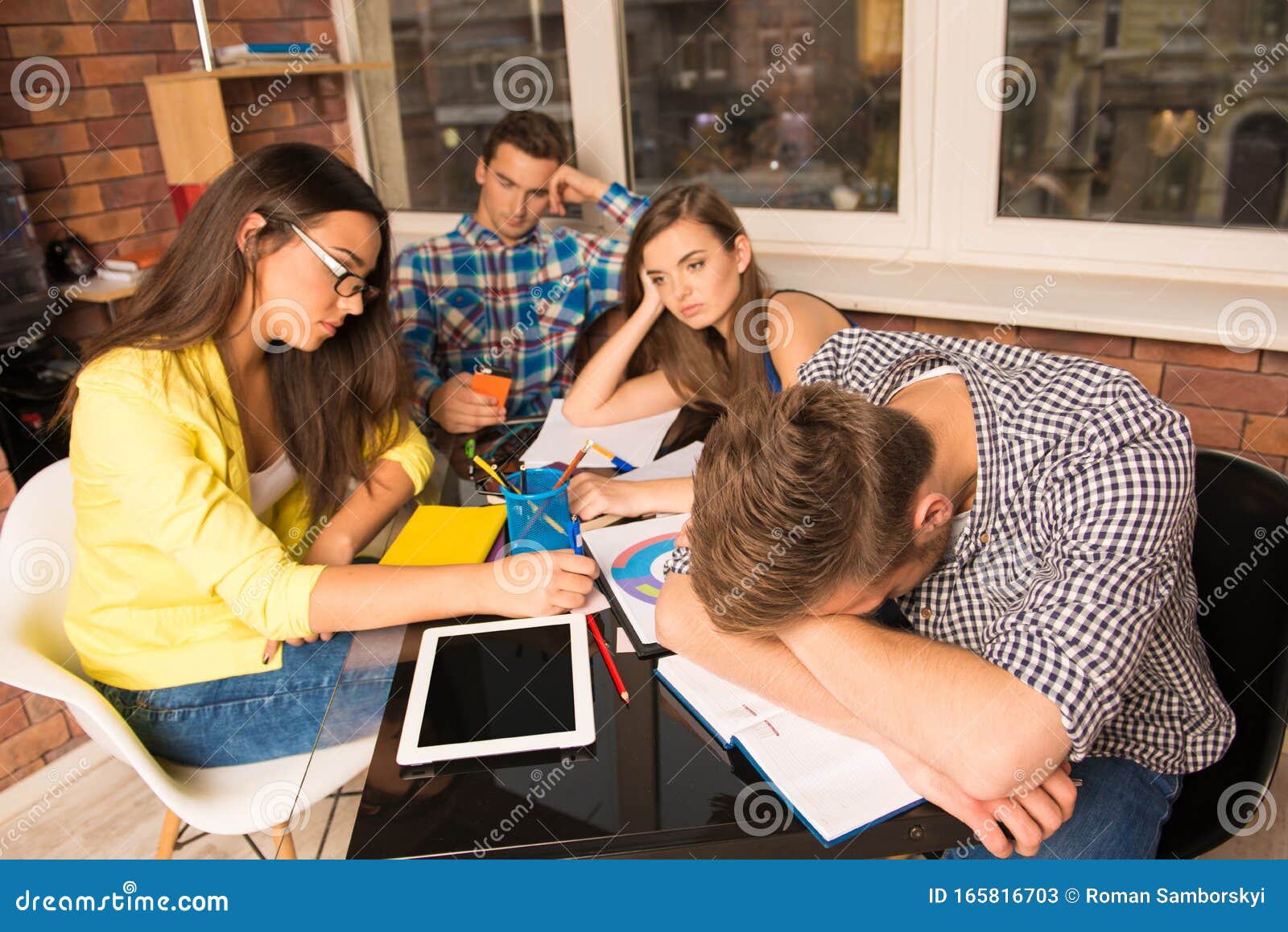 Group of Tired Students Working Hard Together Stock Image - Image of ...