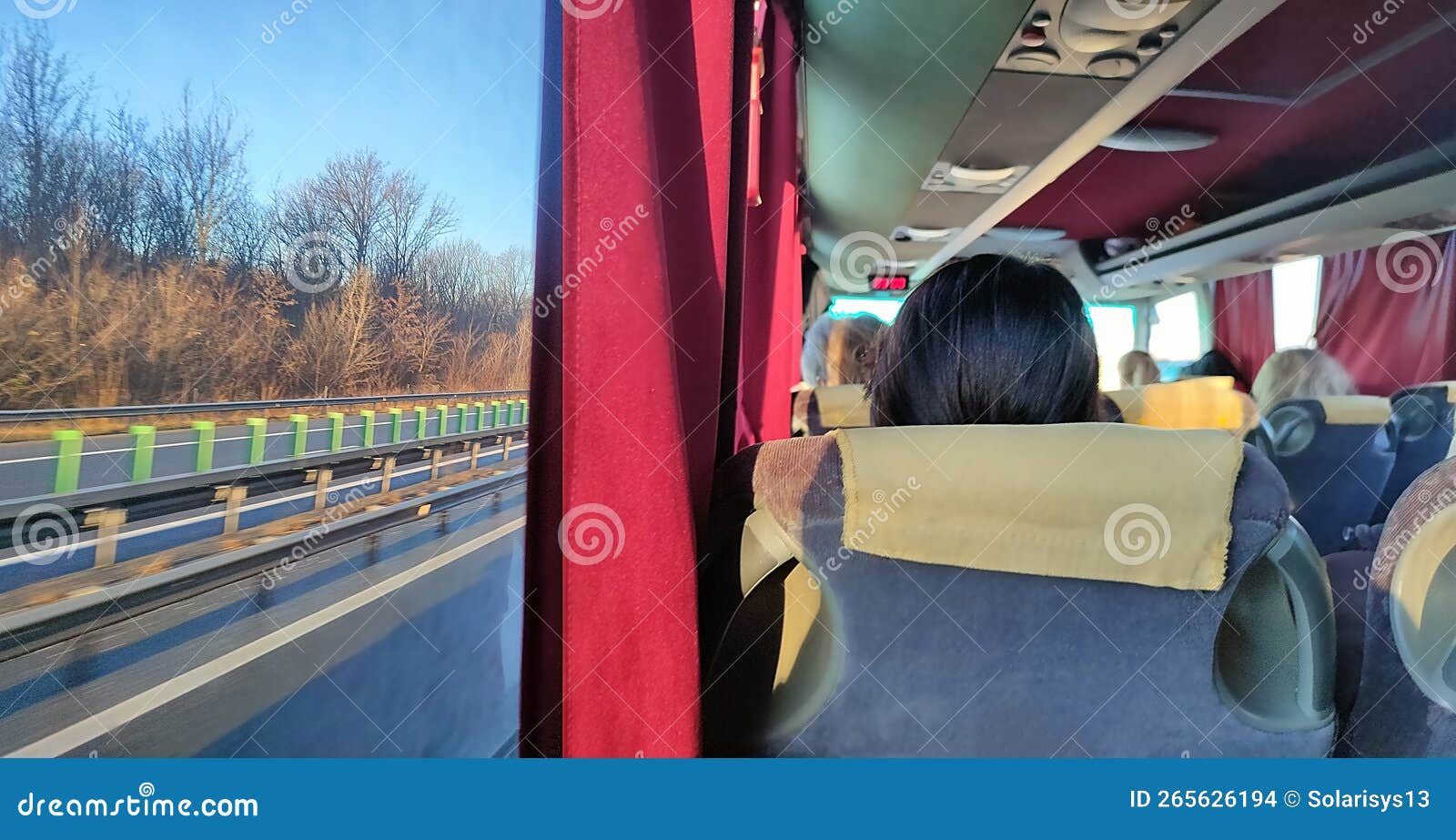 Group of Tourist Sitting in the Bus and Looking through the Bus Windows ...