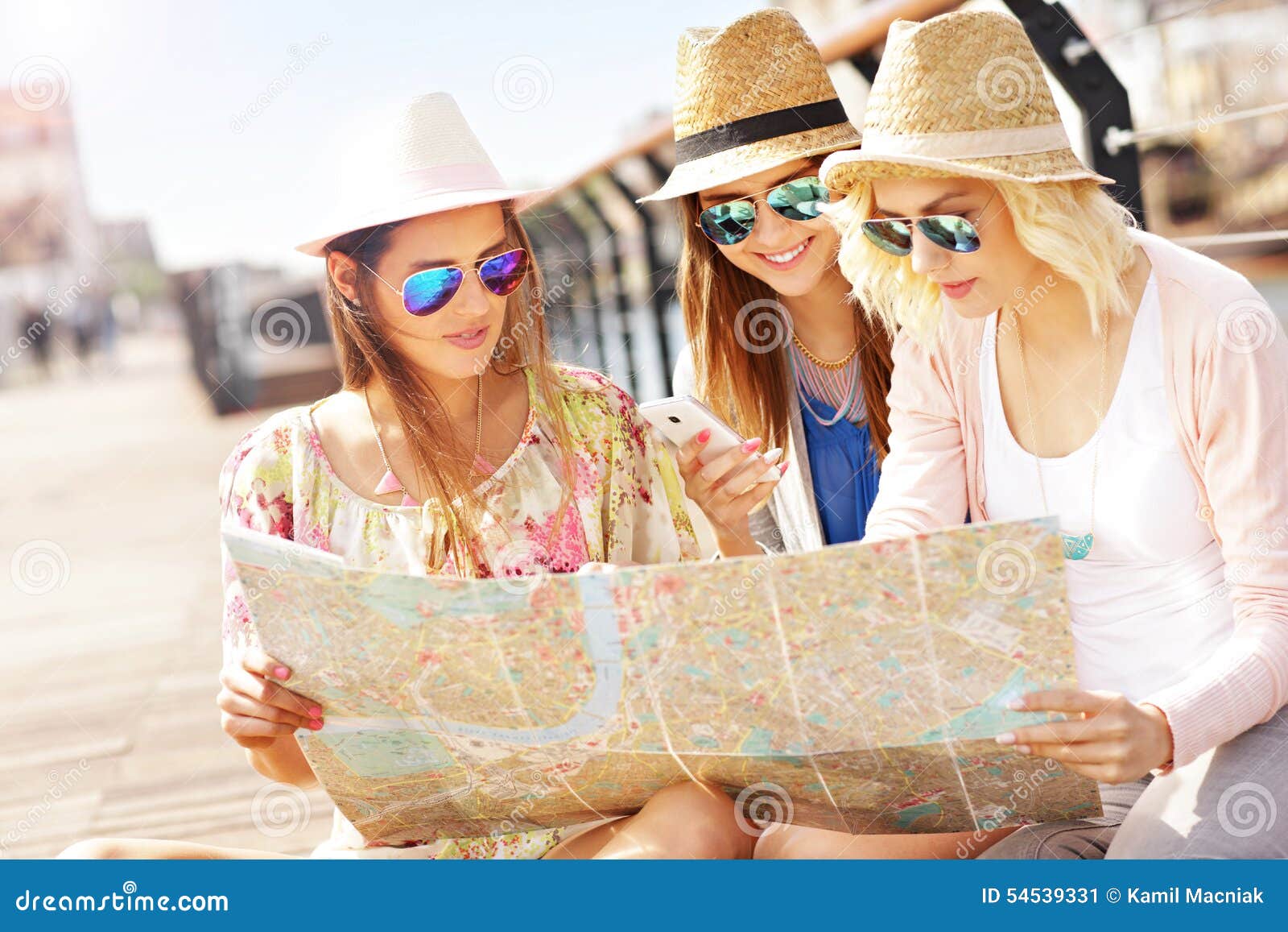 Group Of Tourists Using Map In The City Royalty-Free Stock Photo ...