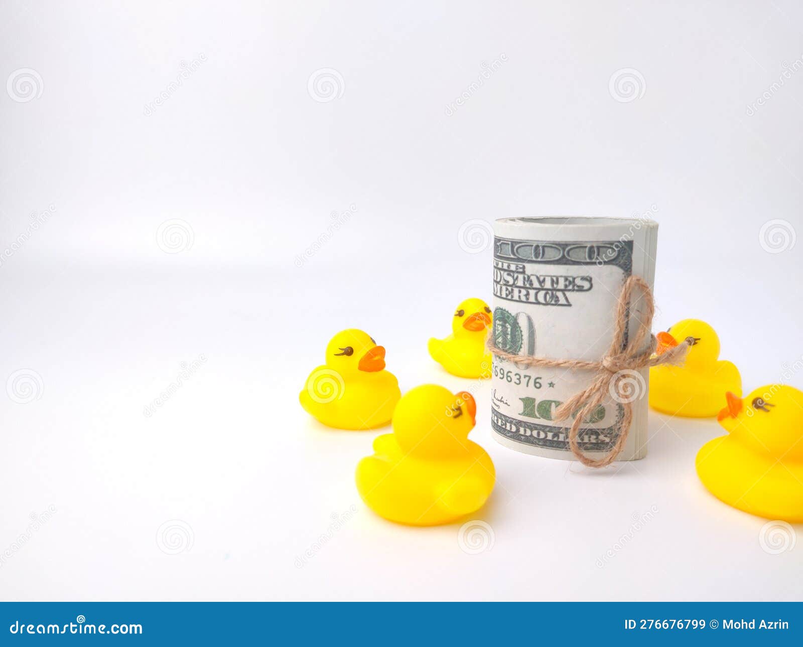 A Group of Toy Ducks Surround the Banknote Stock Image - Image of ...