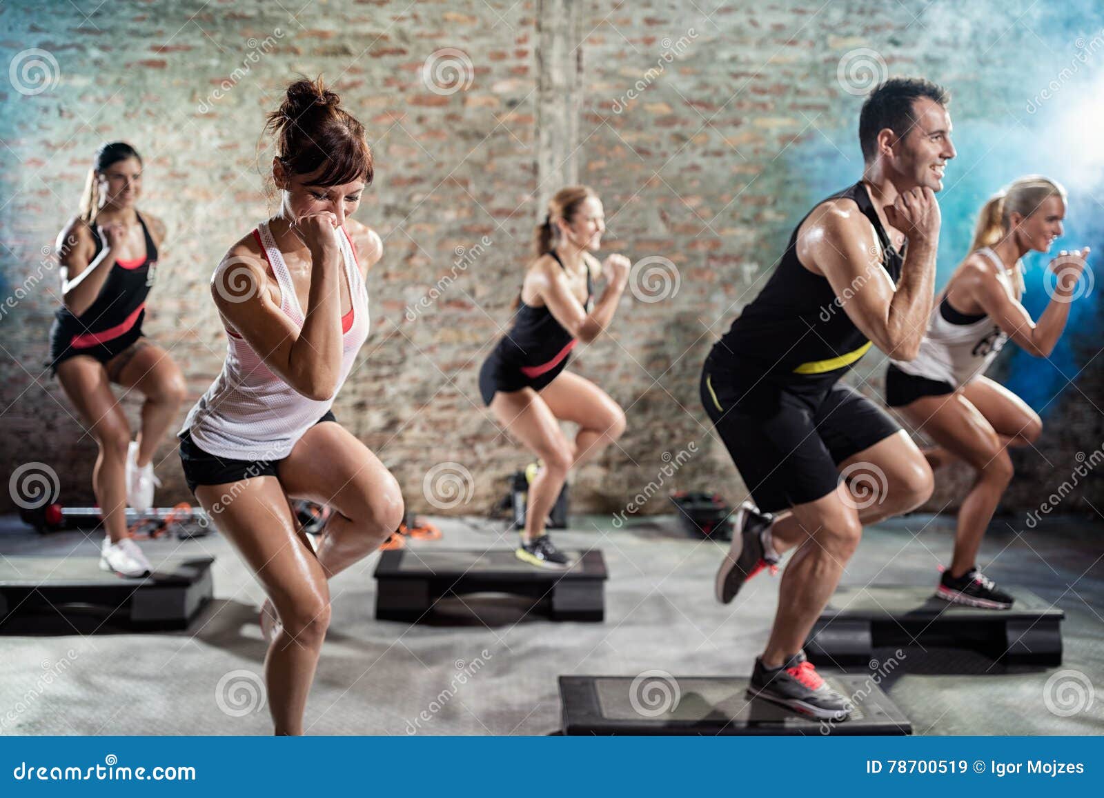 Group training on steppers stock image. Image of group - 78700519
