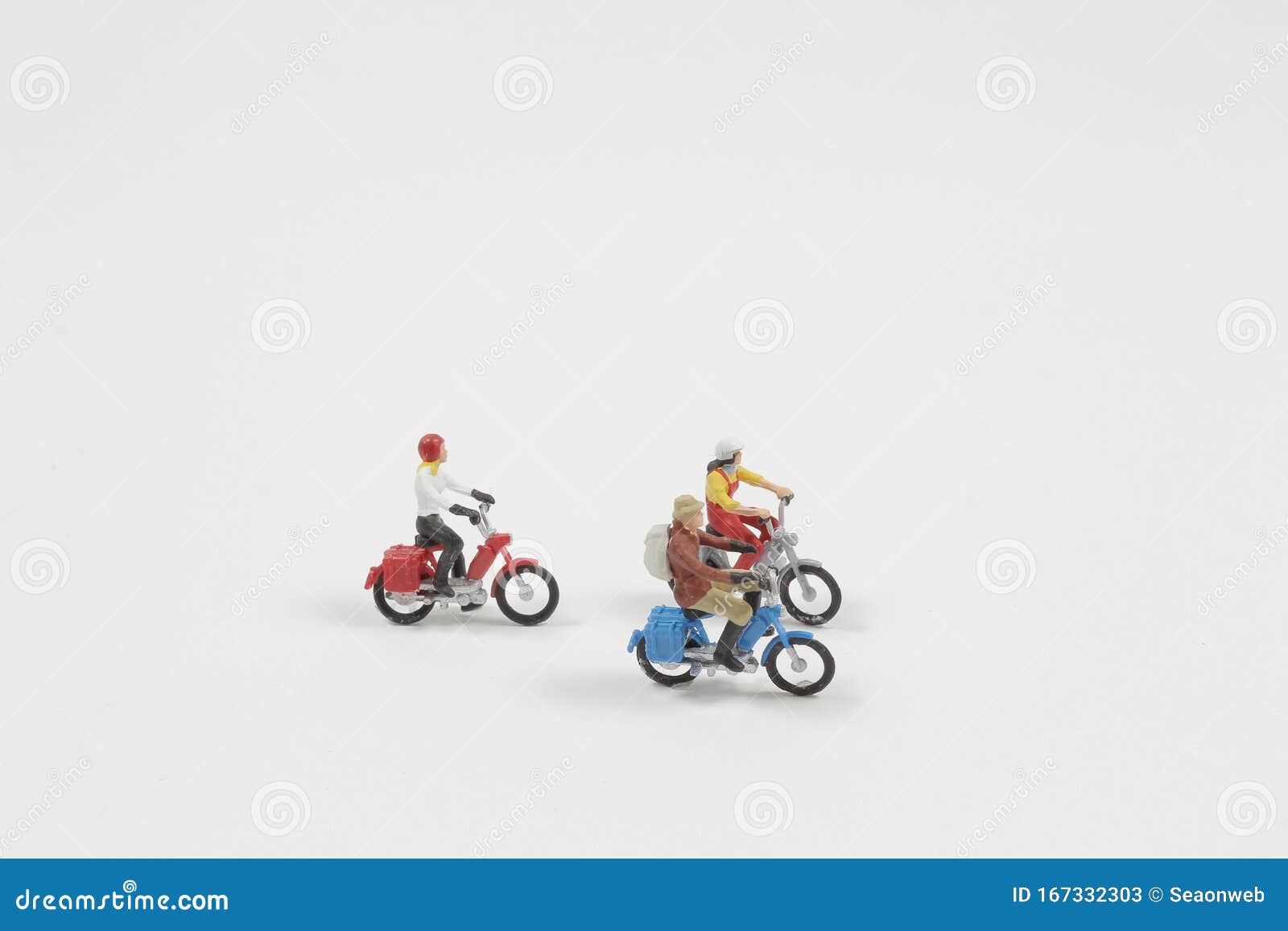 A Group of Traveler Miniature People Figures Ride Motorcycle Stock ...