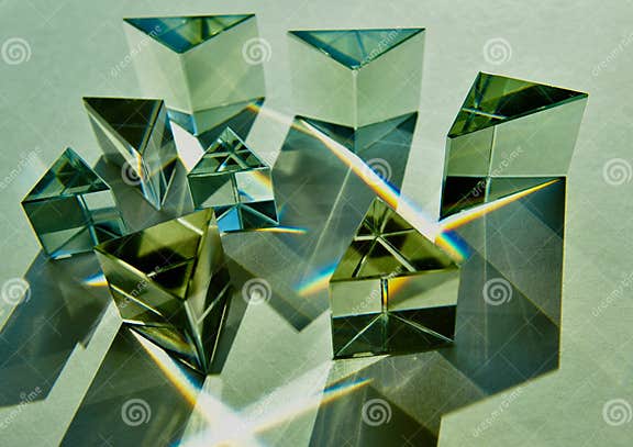 Group of Triangular Clear Prism Refracts and Reflects the Light in ...