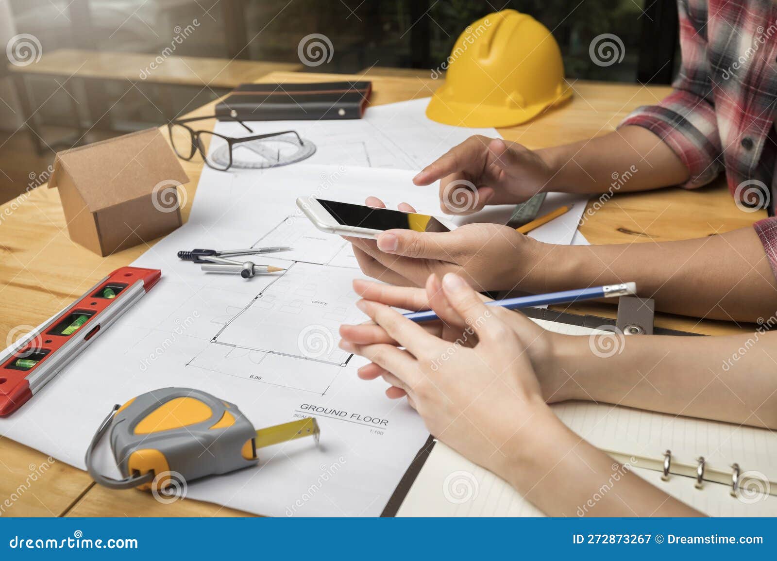 Group of Two Coworkers Working with Blueprint in Office. Co-working ...