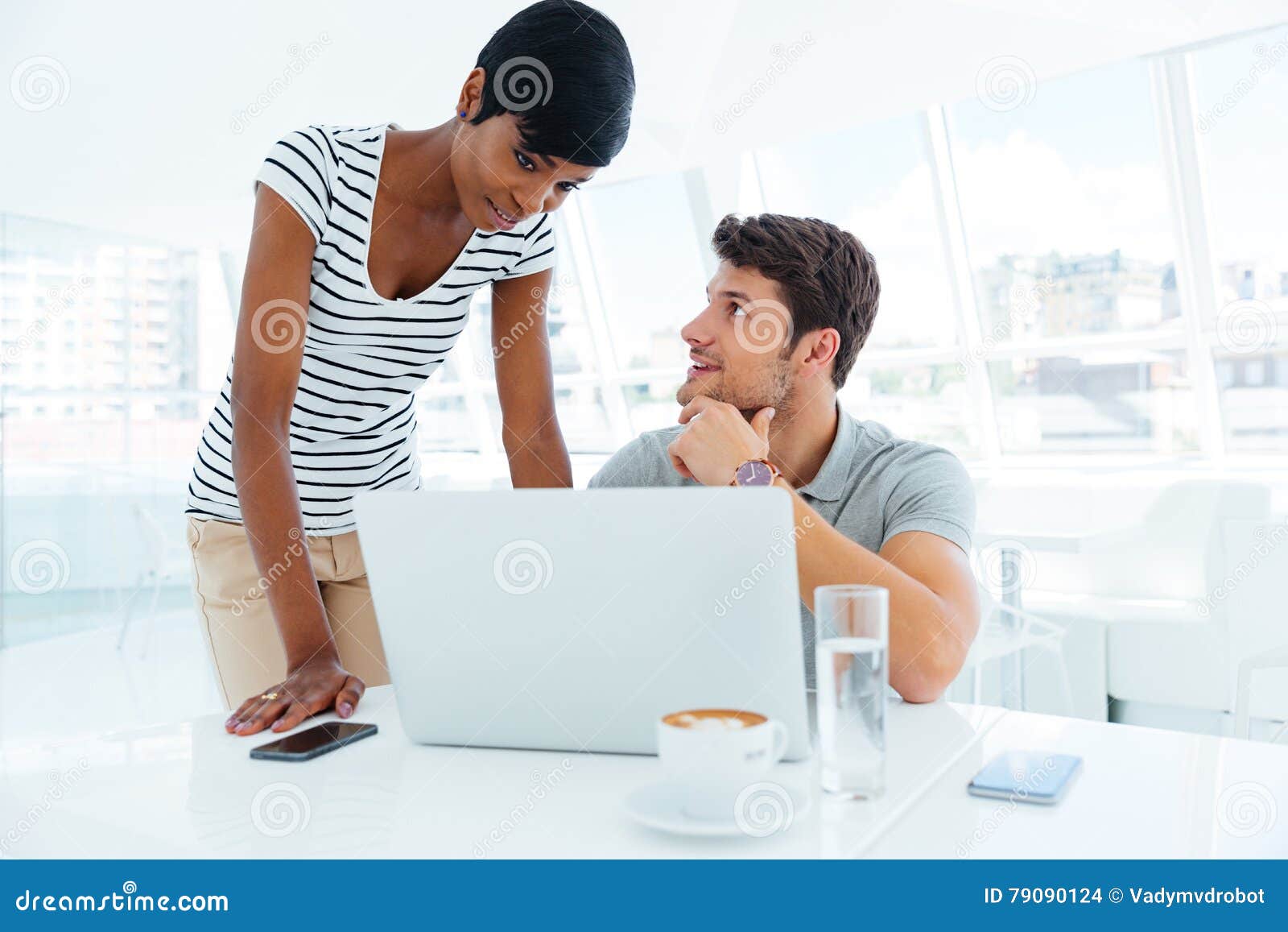 Group of Two Young Businesspeople Working Together in Conference Room ...