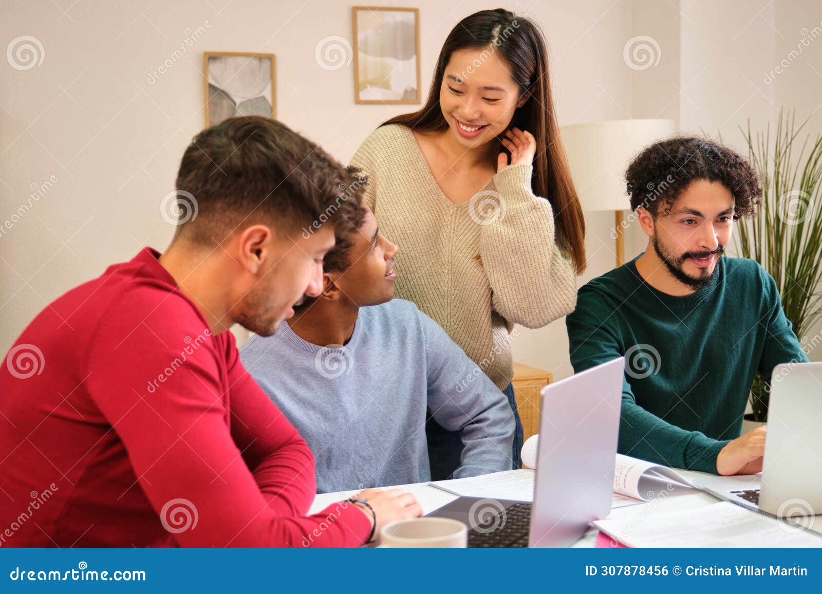 Group of University Colleague Studying Together at Shared Students ...