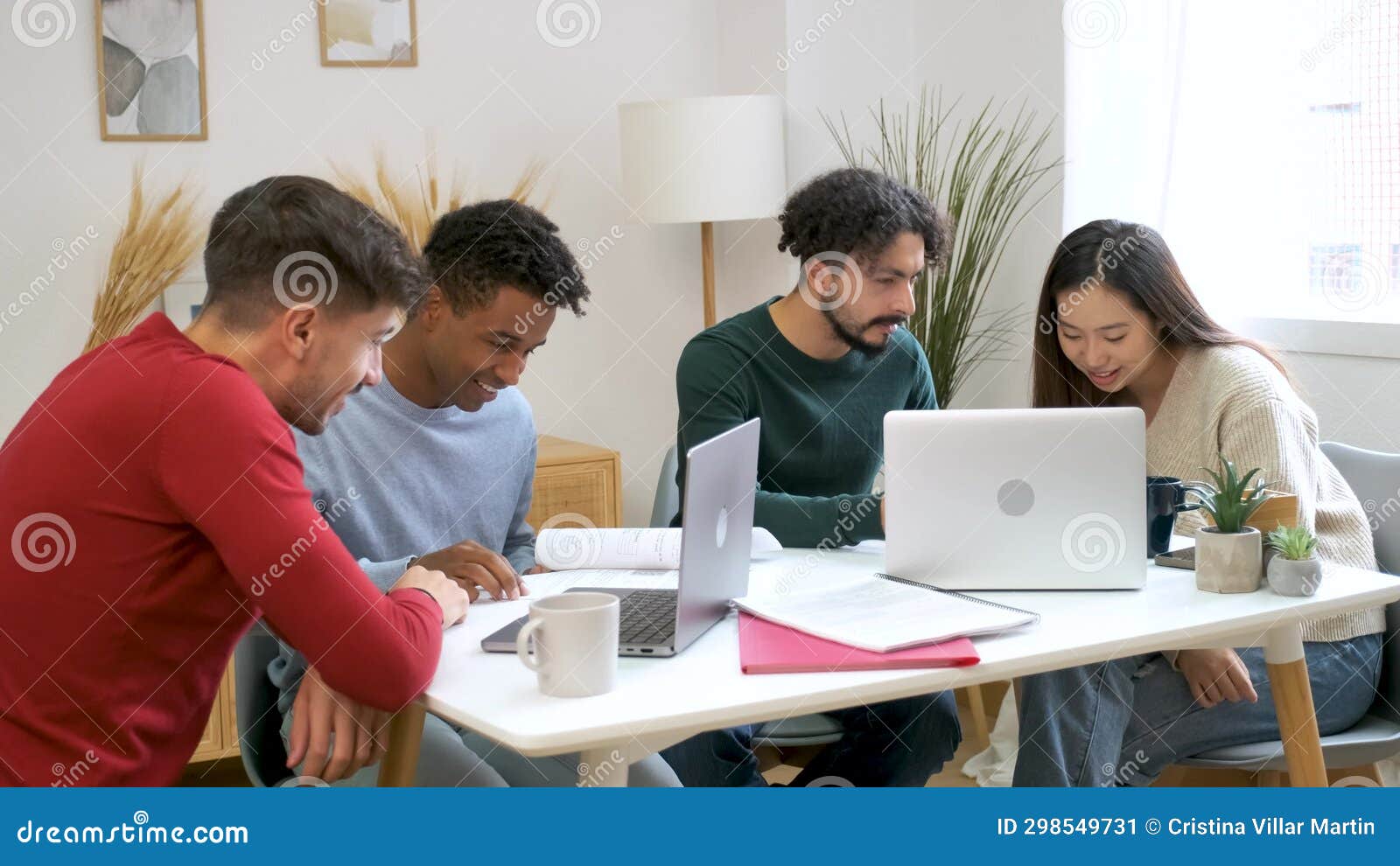 Group of University Colleagues Studying Together at Shared Students ...