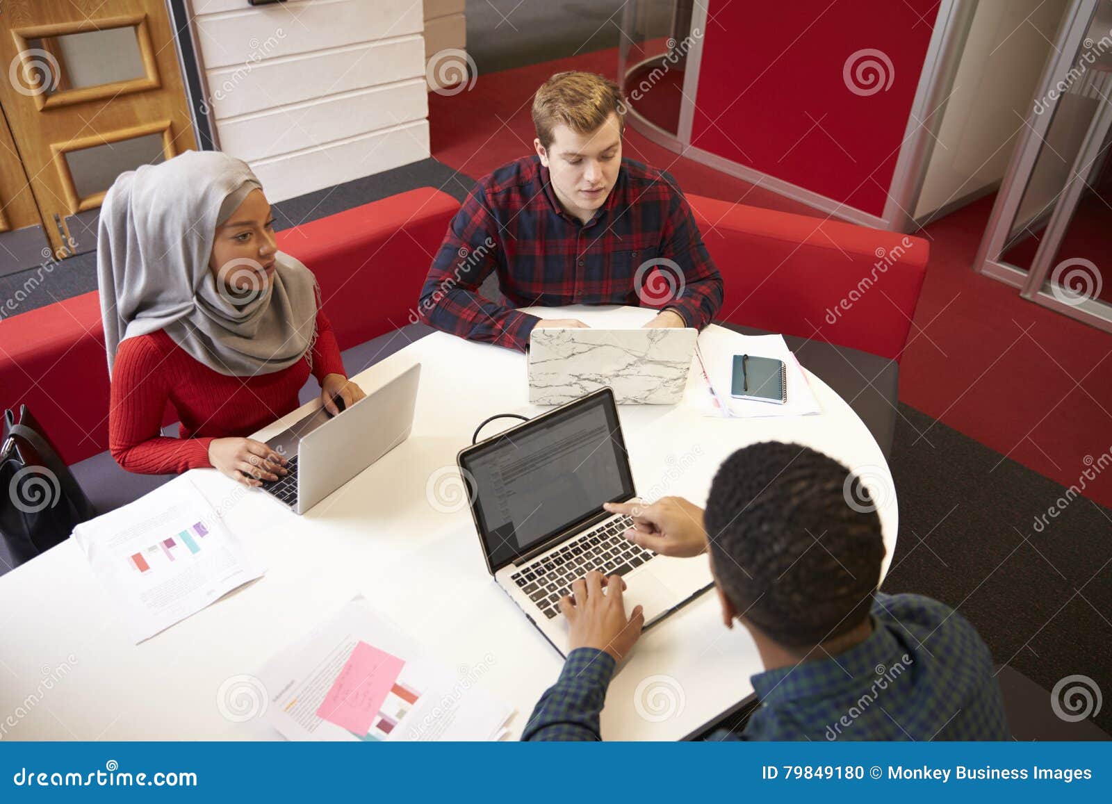 Group of University Students Collaborating on Project Stock Photo ...