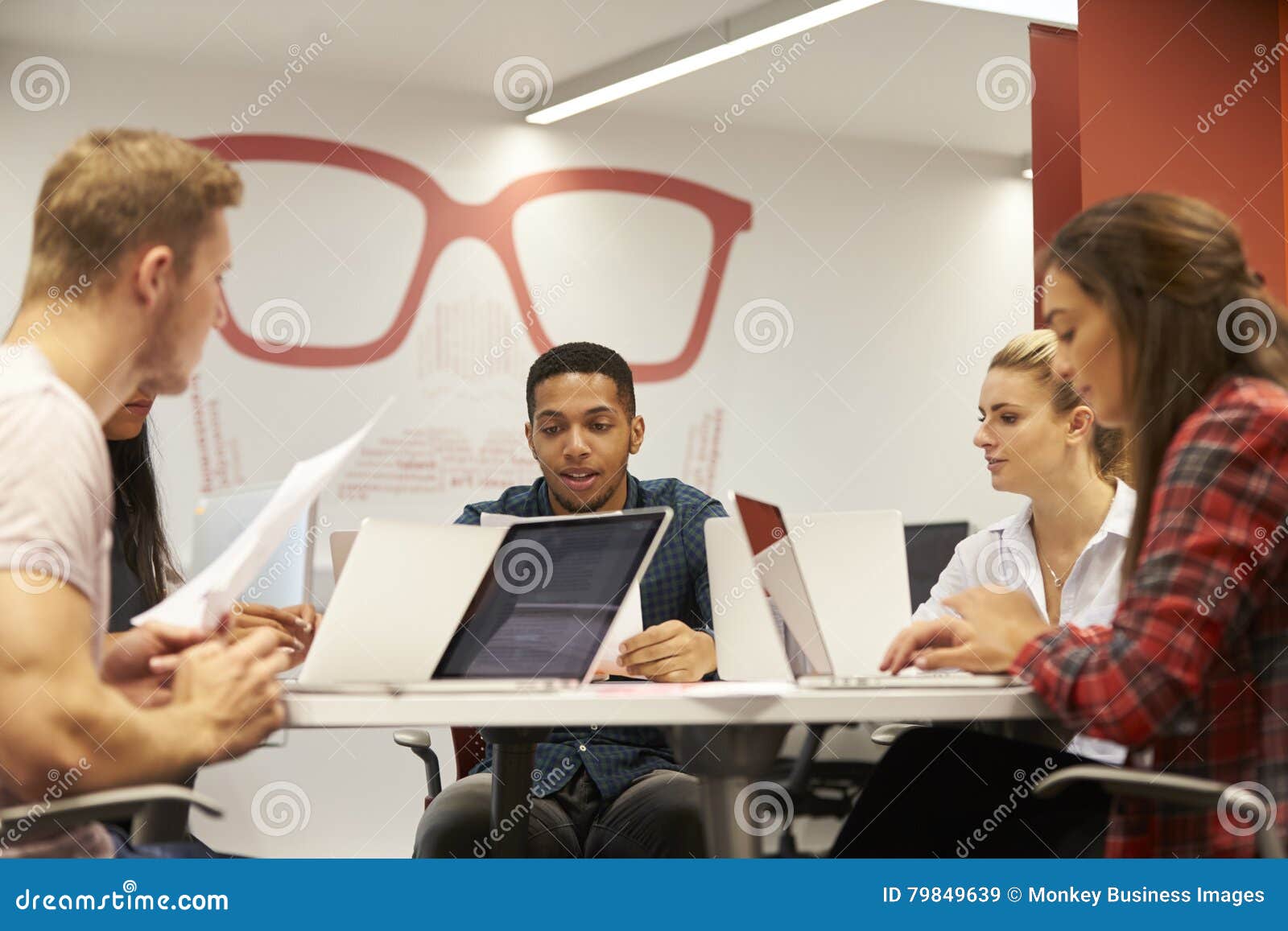 Group of University Students Collaborating on Project Stock Image ...