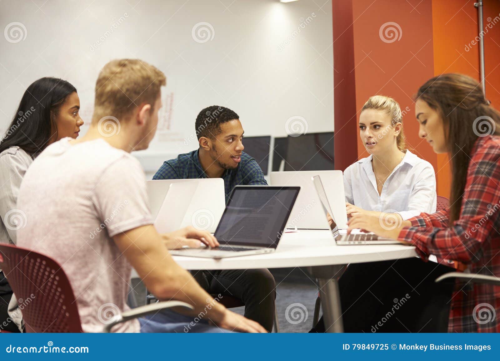 Group of University Students Collaborating on Project Stock Image ...