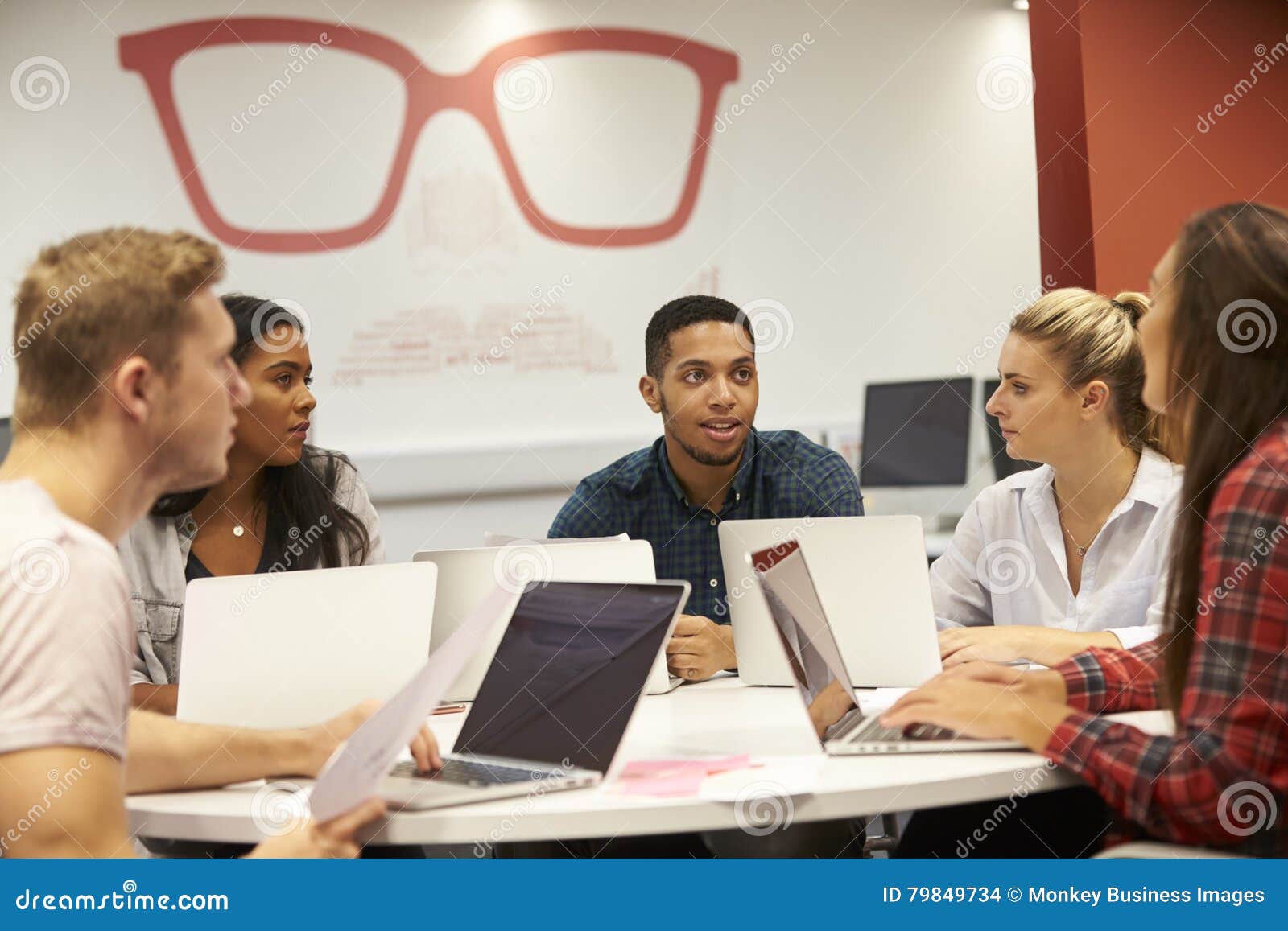 Group of University Students Collaborating on Project Stock Photo ...