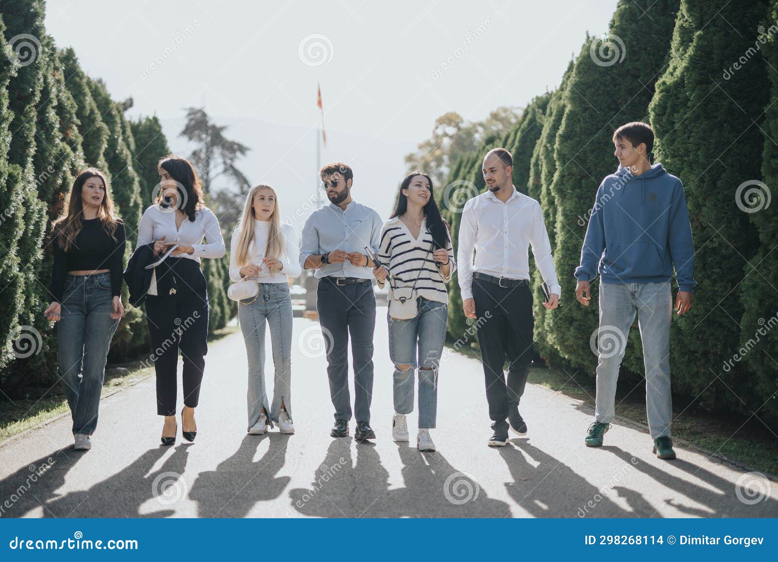 Group of University Students Discussing and Exchanging Knowledge in a ...