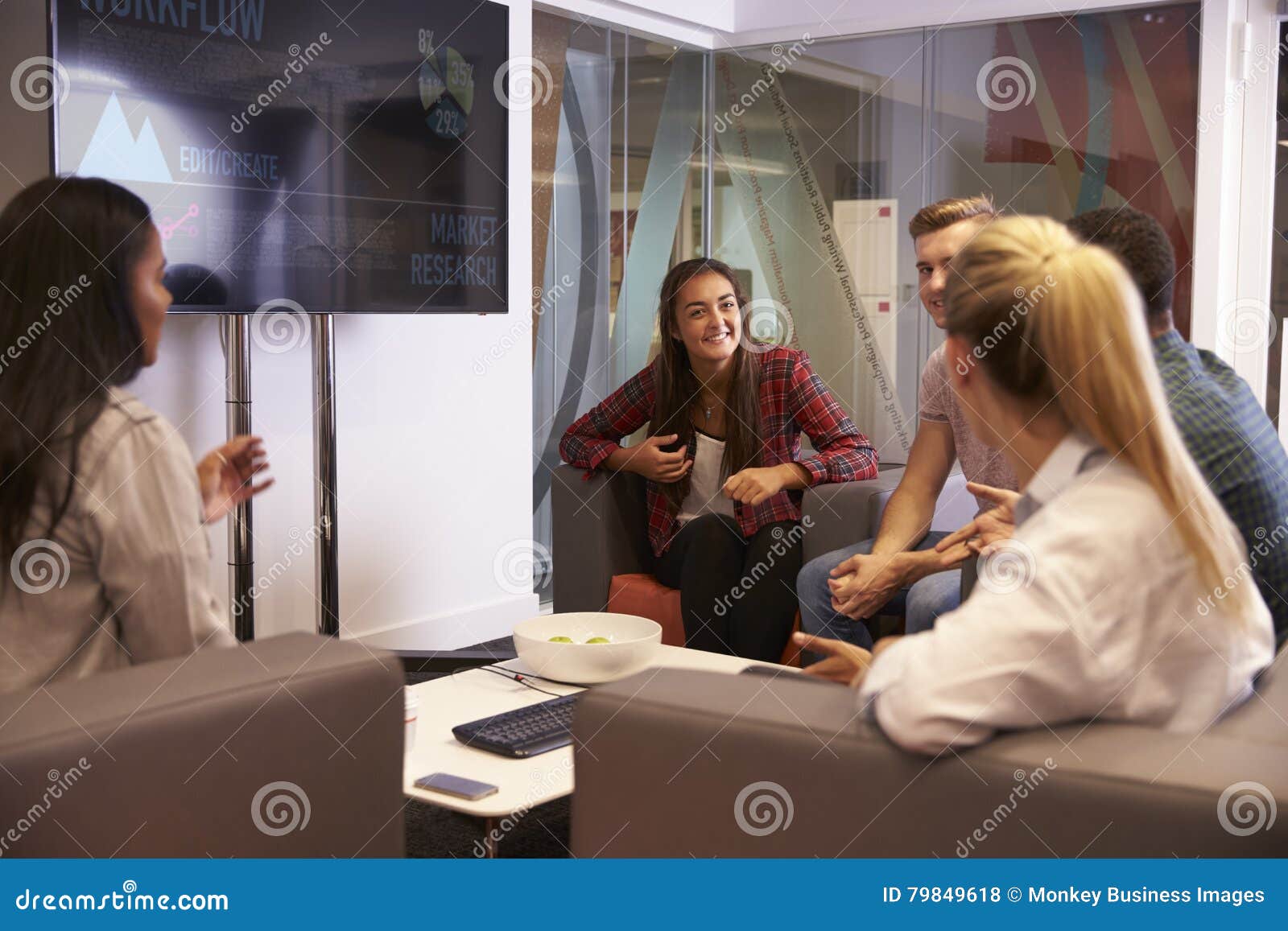 Group of University Students Discussing Project Together Stock Photo ...