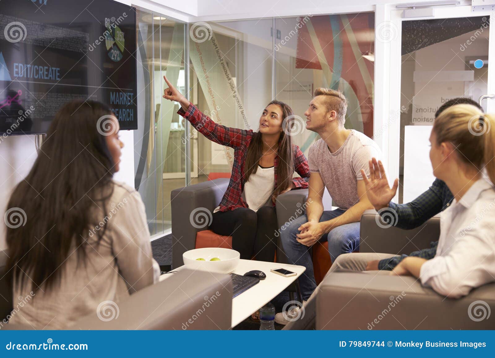 Group of University Students Discussing Project Together Stock Photo ...