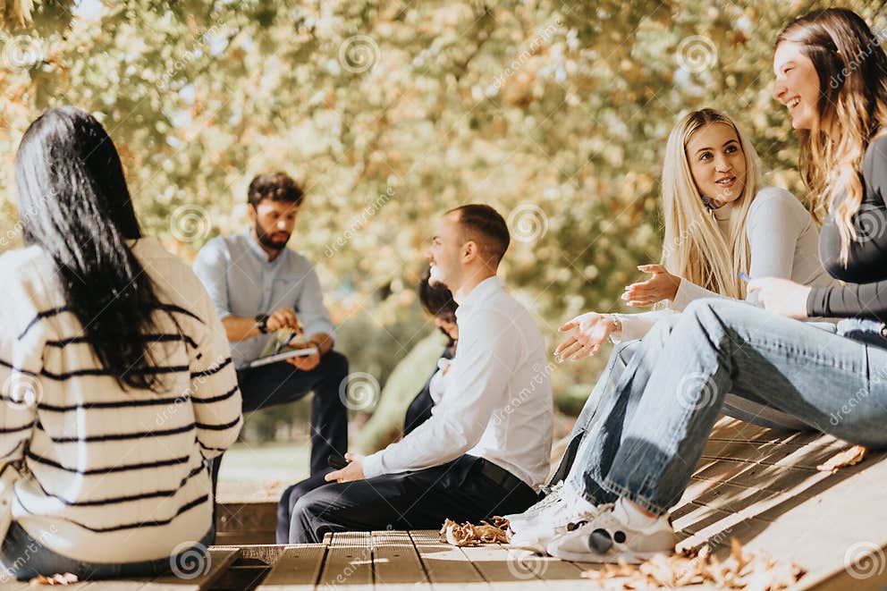 Group of University Students Discussing Topics and Solving Tasks ...