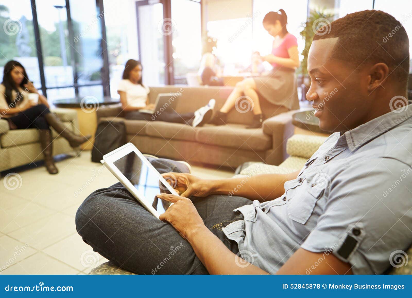 Group of University Students Relaxing in Common Room Stock Photo ...