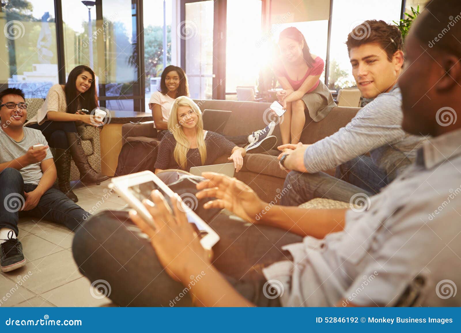 Group of University Students Relaxing in Common Room Stock Photo ...