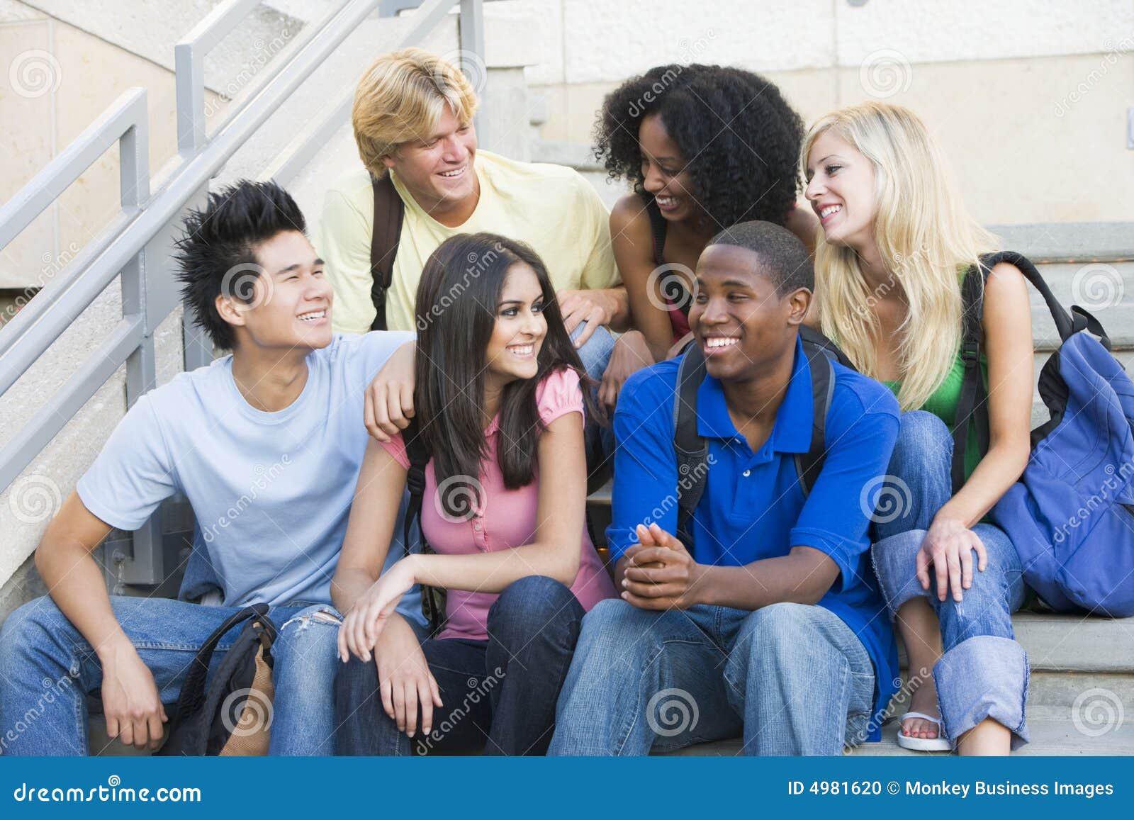 Group of University Students Sitting on Steps Stock Photo - Image of ...