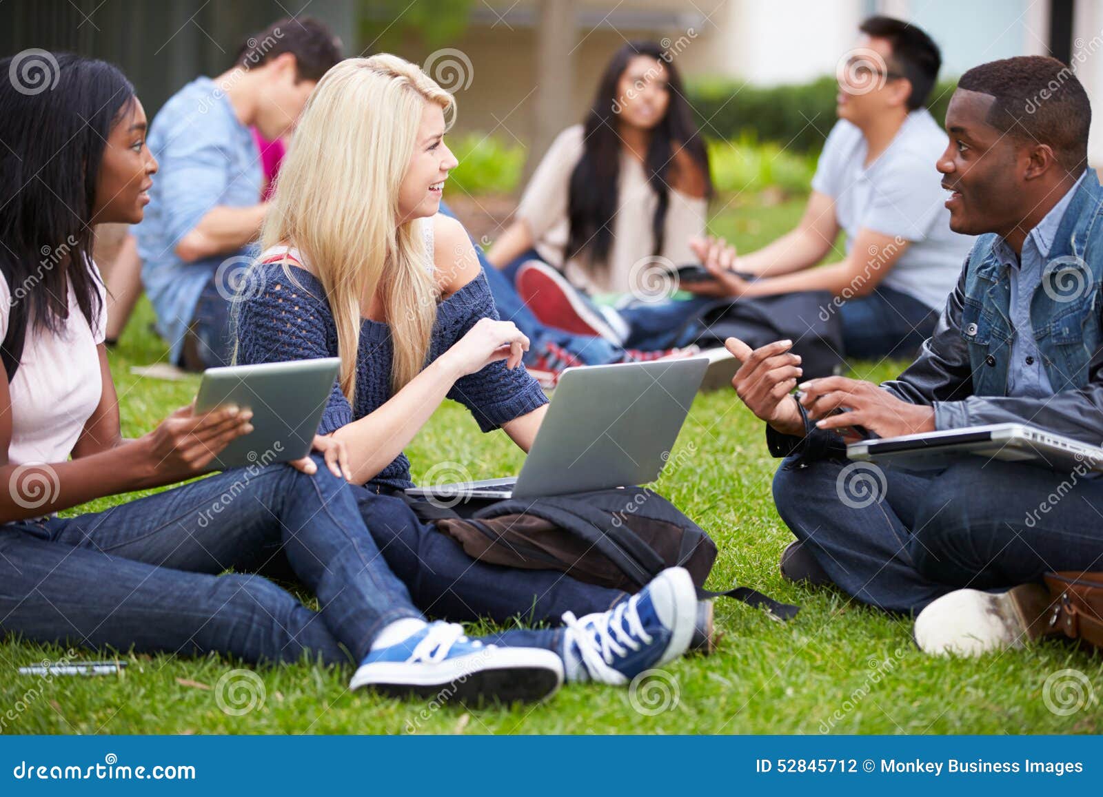 Group of University Students Working Outside Together Stock Photo ...