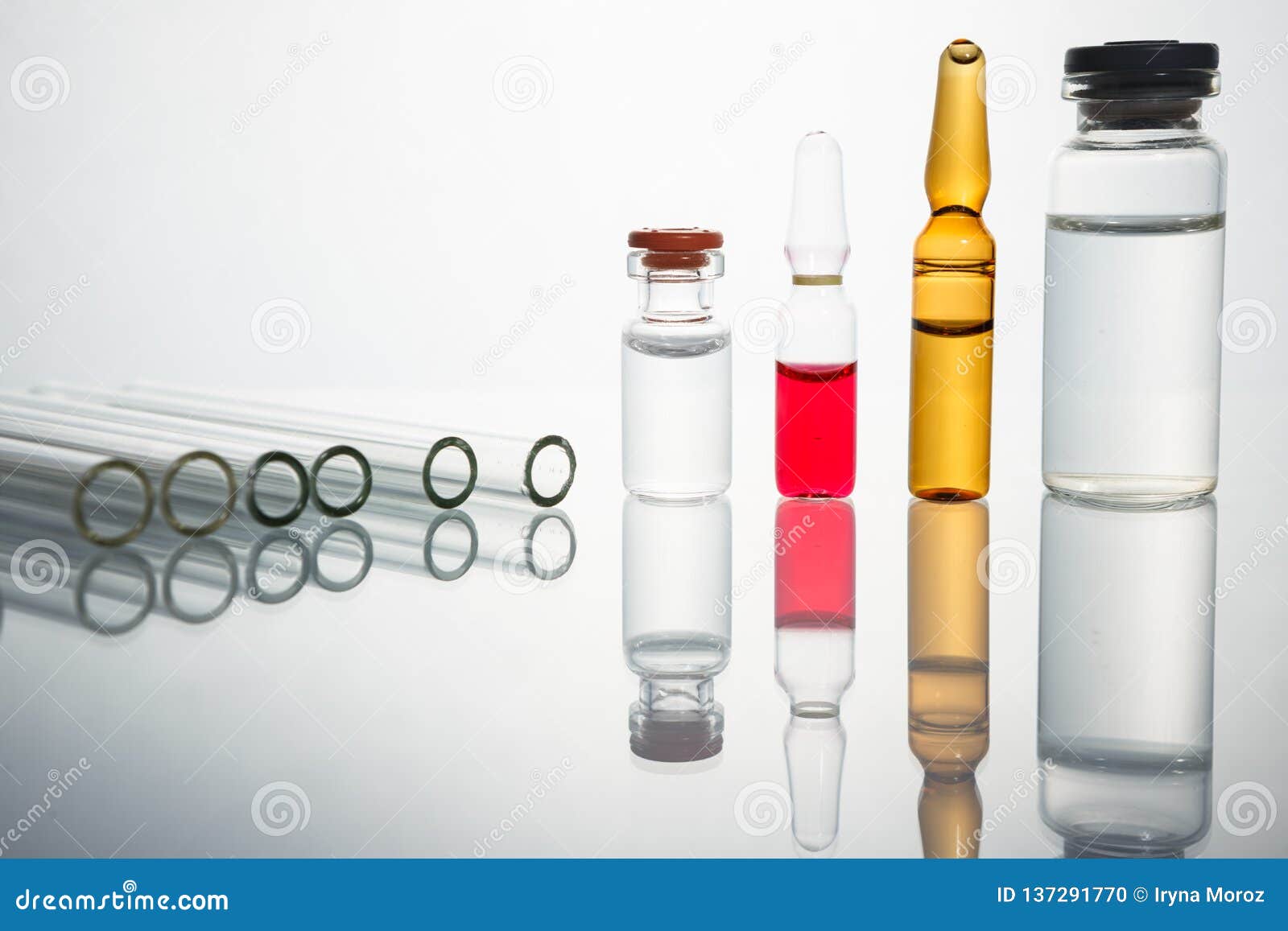 Group of Vials with Medication on Blue Methacrylate Table Stock Photo ...