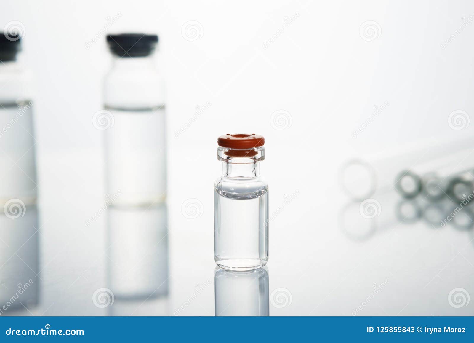 Vials Group And Syringe On Table With Blue Background Stock Image ...