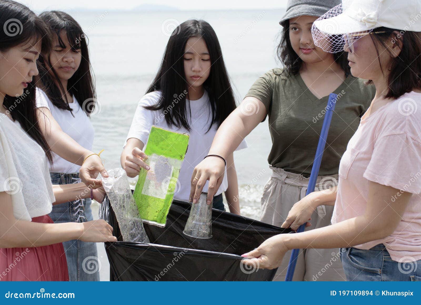 Group of Volunteers Cleans Beach Out of Plastic Gabbage Stock Photo ...